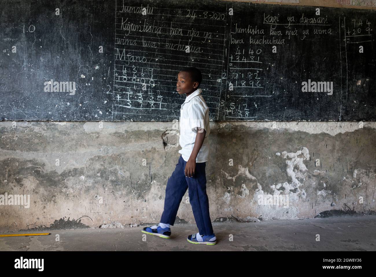 Poor boy rear view hi-res stock photography and images - Alamy