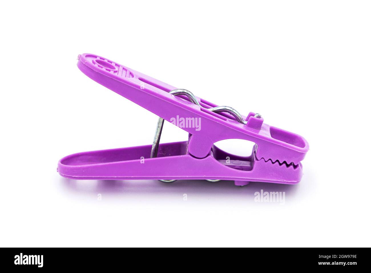 Colorful plastic clothespin or clothes peg isolated on white background ...