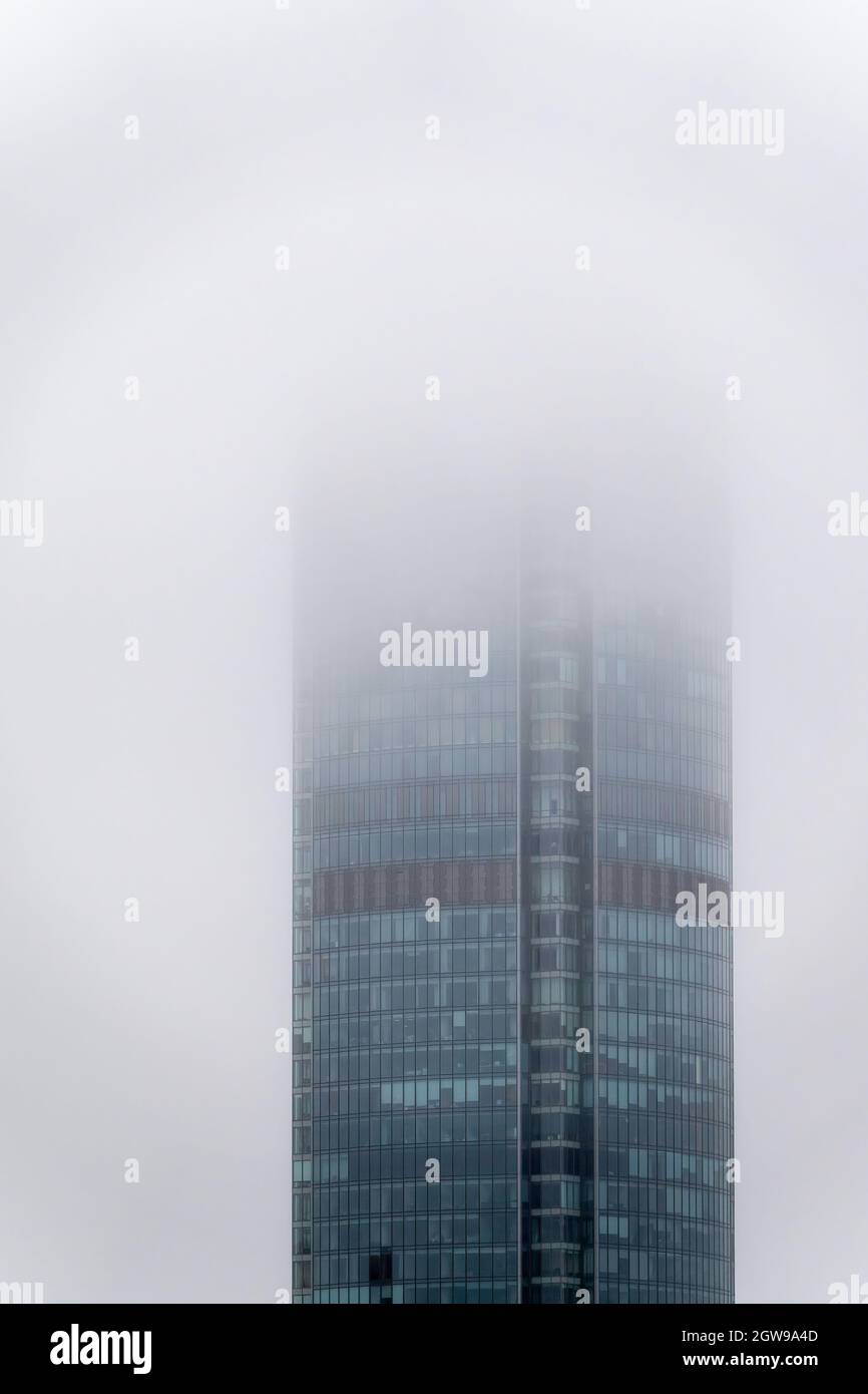 The modern Skyscraper is hidden in the fog. Hiding in the Fog Stock ...