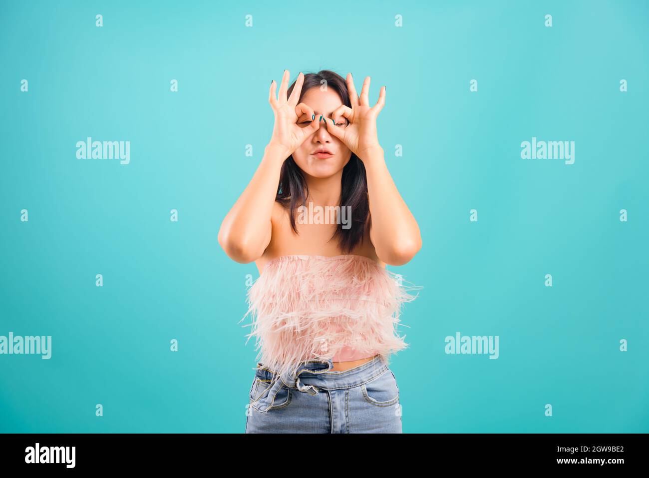 Woman attitude hand over mouth hi-res stock photography and images - Alamy