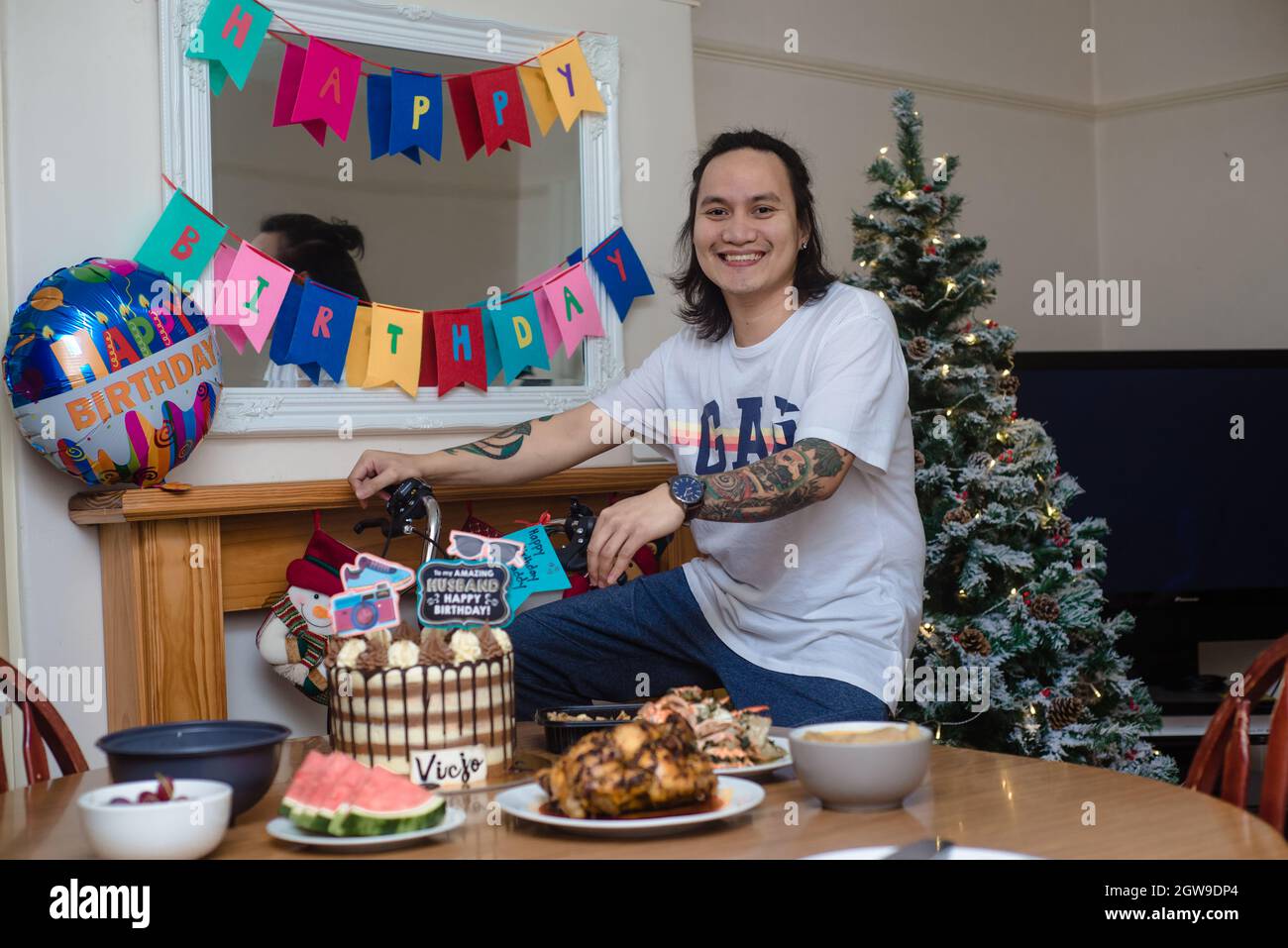Birthday Celebration At Home With Family Stock Photo - Alamy