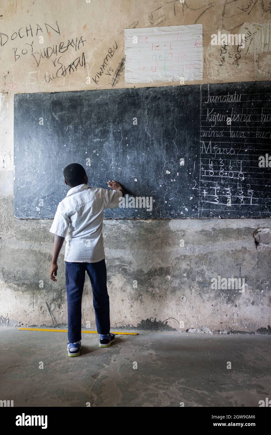 Poor boy rear view poverty hi-res stock photography and images - Alamy