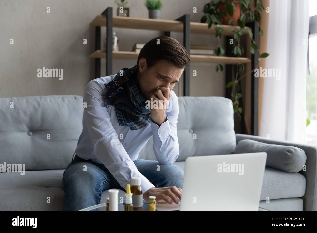 Businessman sick working on laptop hi-res stock photography and images ...