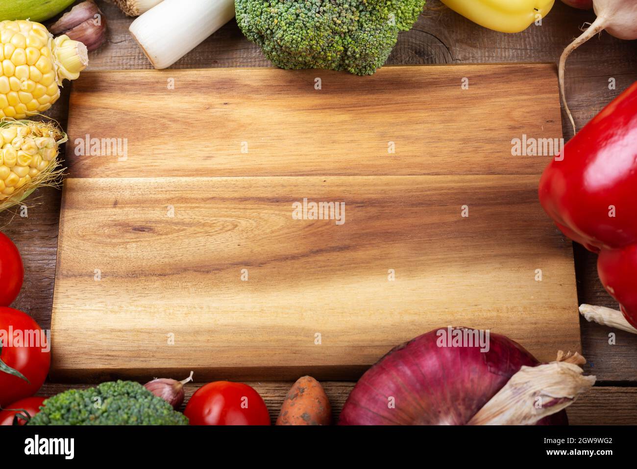 Healthy eating. Vegetables on a white wooden table. Organic food frame ...