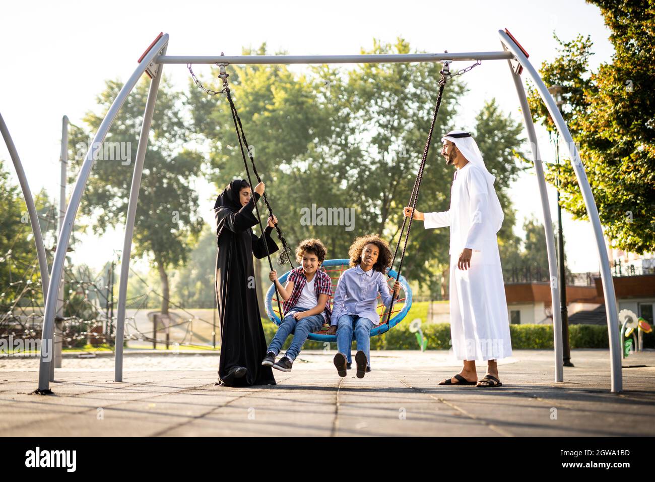 Cinematic image of a family playing at the playground in Dubai Stock ...