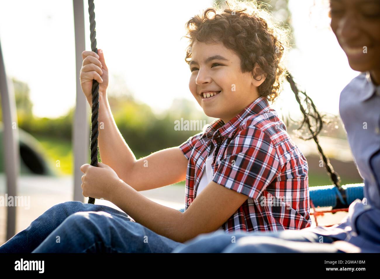 Cinematic image of children playing at the playground Stock Photo - Alamy