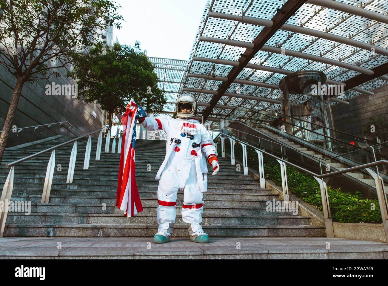 spaceman in a futuristic station. Man with space suit walking in an ...
