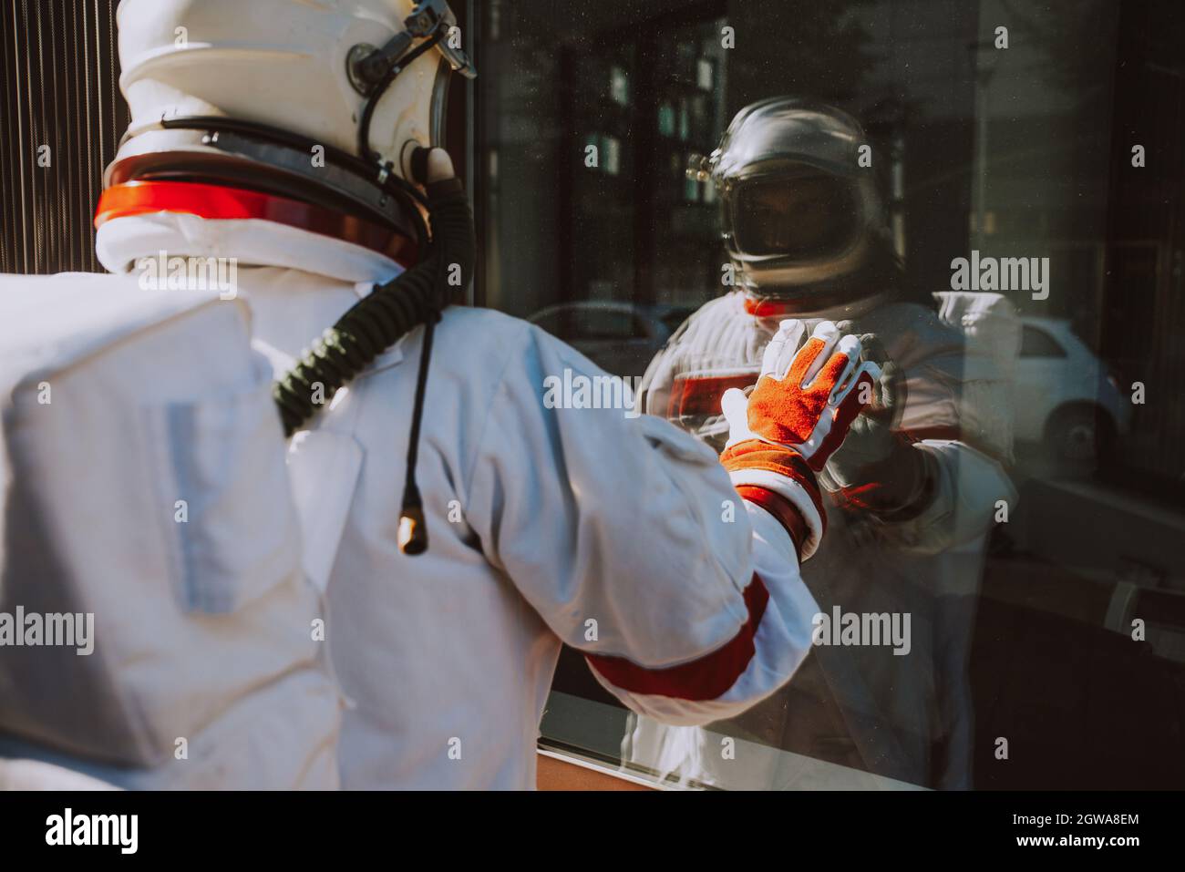 spaceman in a futuristic station. Man with space suit walking in an ...