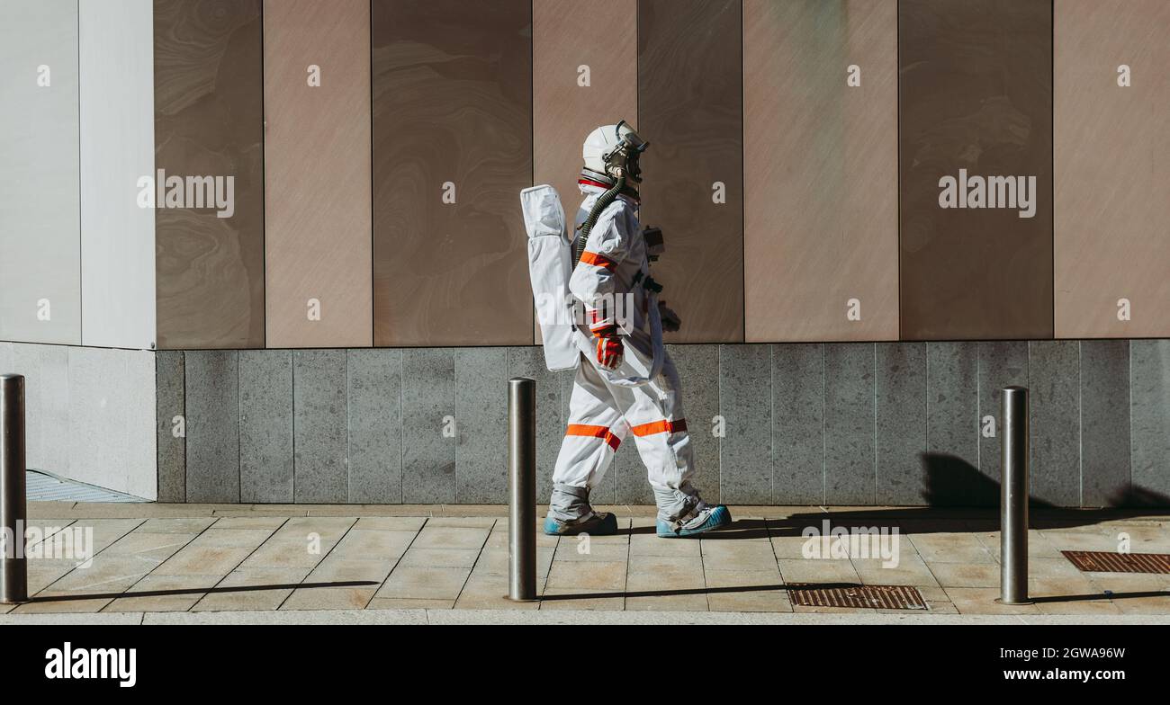 spaceman in a futuristic station. astronaut with space suit walking in ...