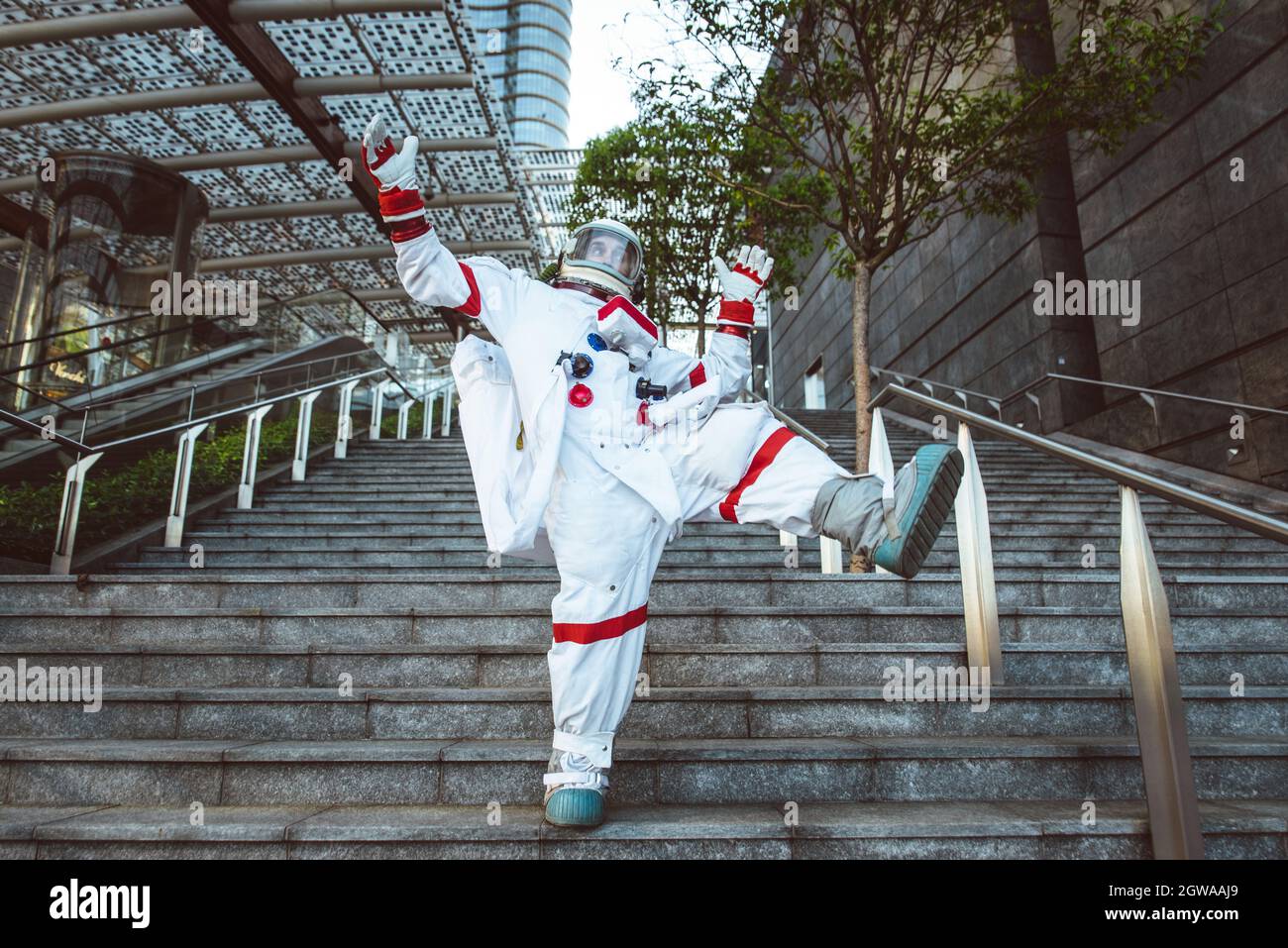 spaceman in a futuristic station. Man with space suit walking in an ...