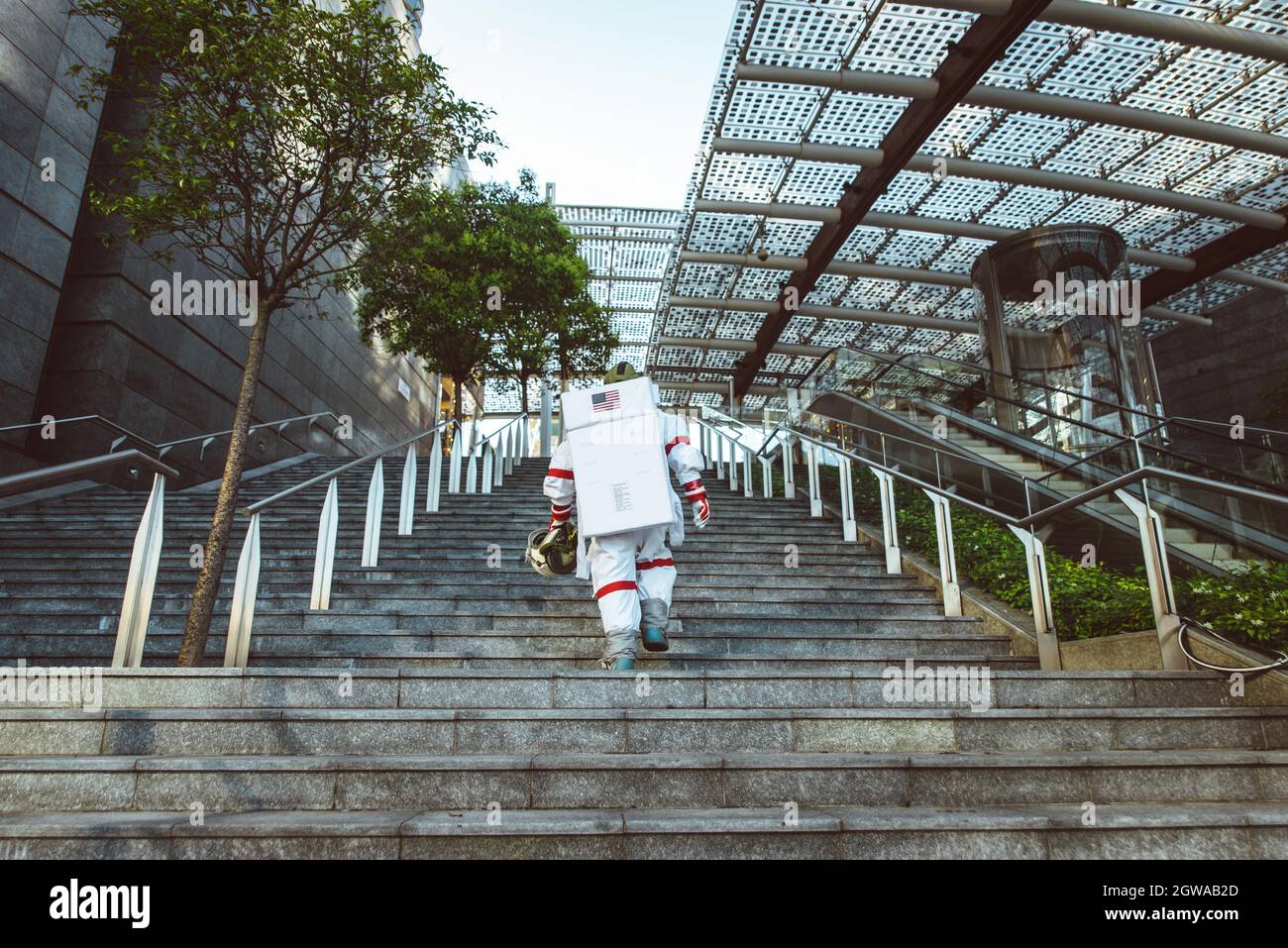 spaceman in a futuristic station. Man with space suit walking in an ...
