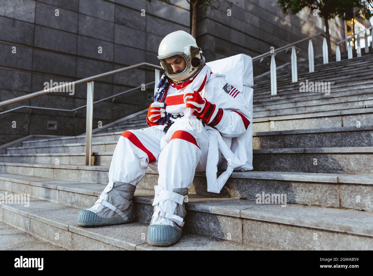 spaceman in a futuristic station. Man with space suit walking in an ...