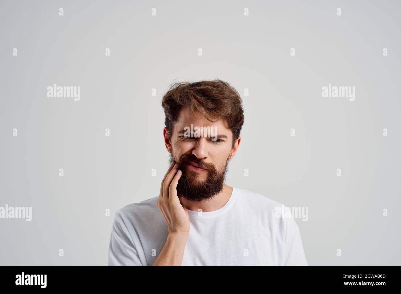 emotional man dental problem dentistry treatment light background Stock ...