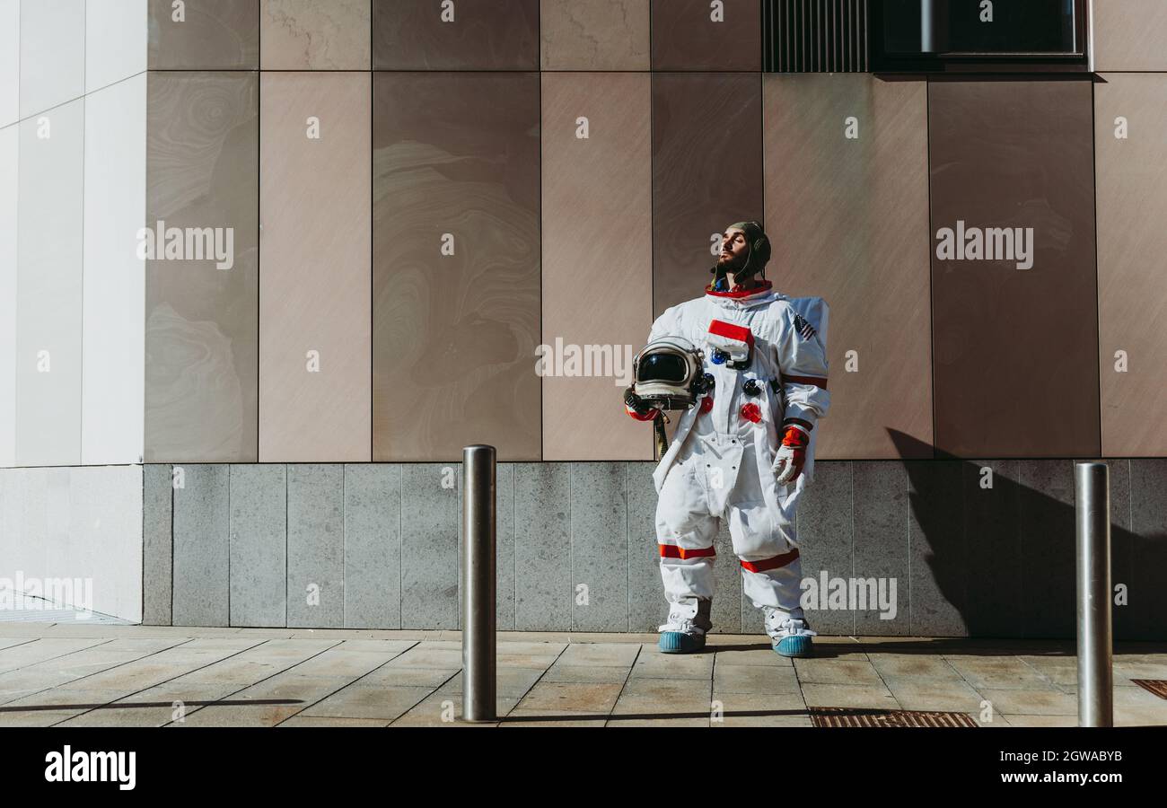 spaceman in a futuristic station. astronaut with space suit walking in ...
