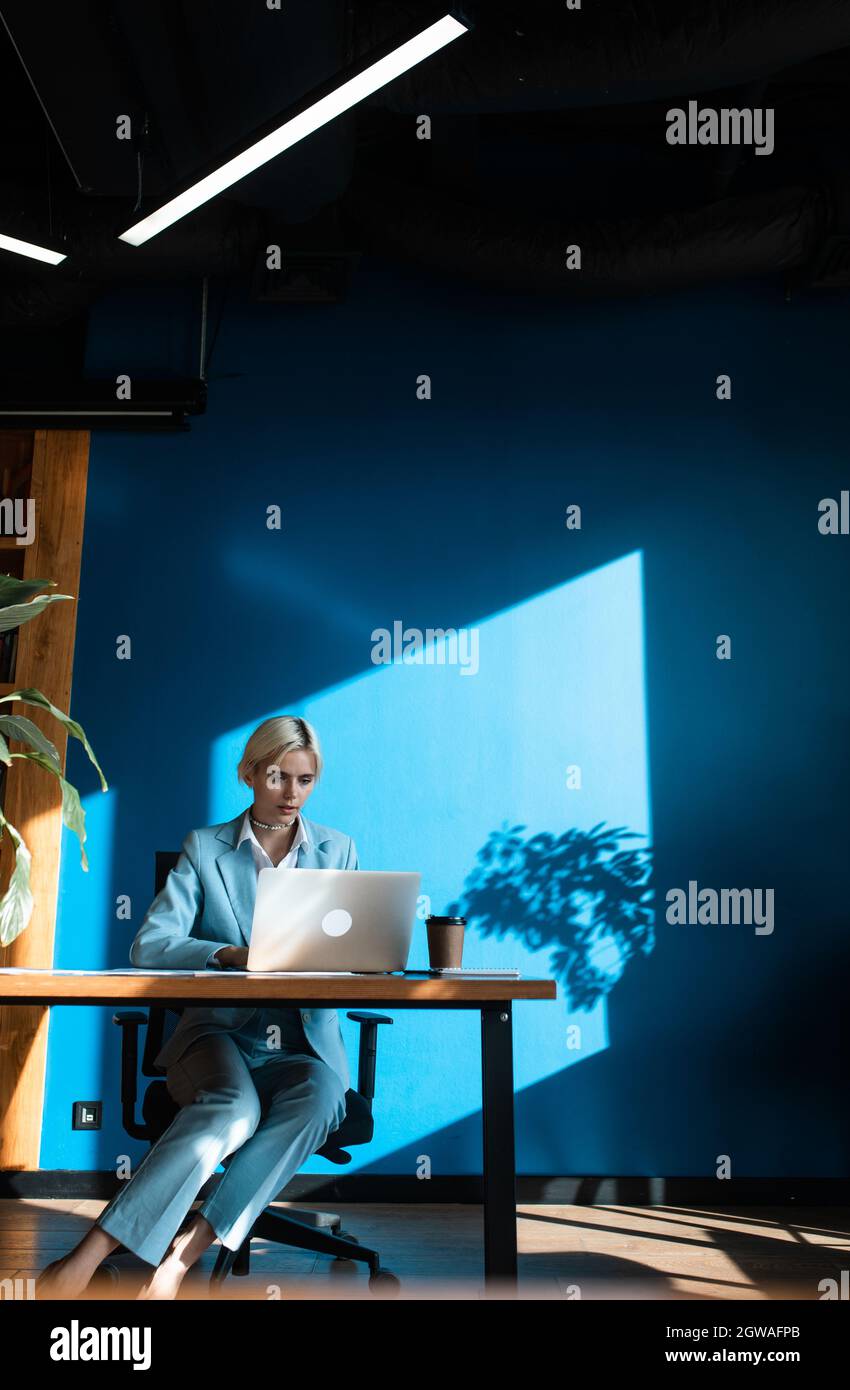 cinematic image of a young beautiful business woman. Portrait of an ...