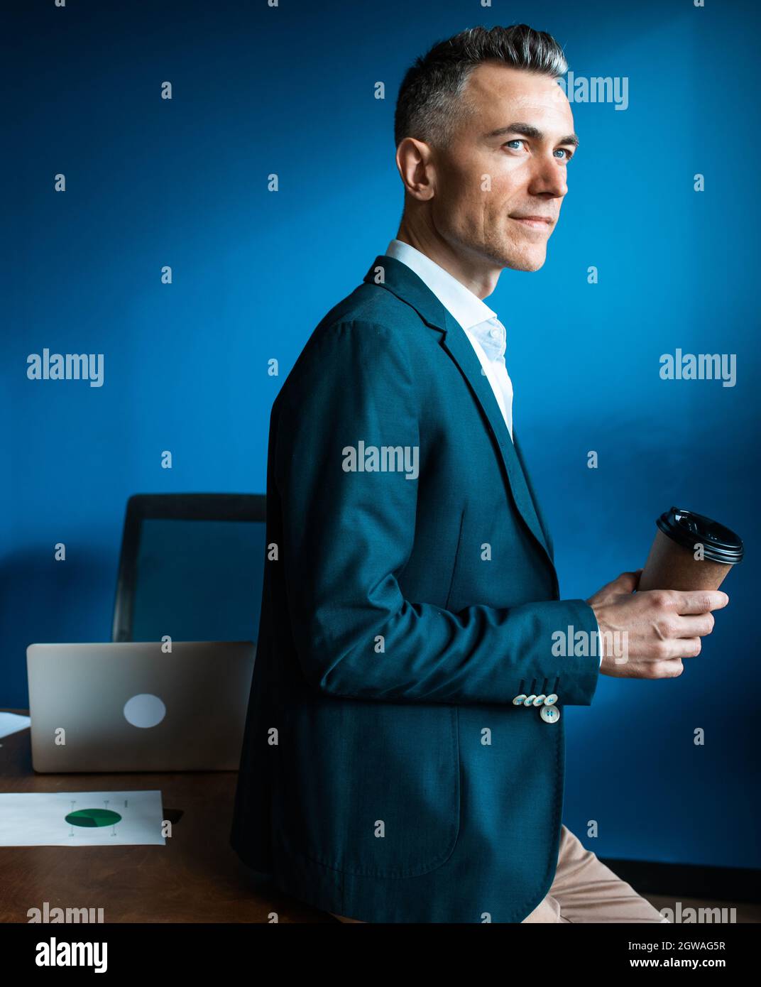 cinematic image of a senior handsome business man. Portrait of an ...