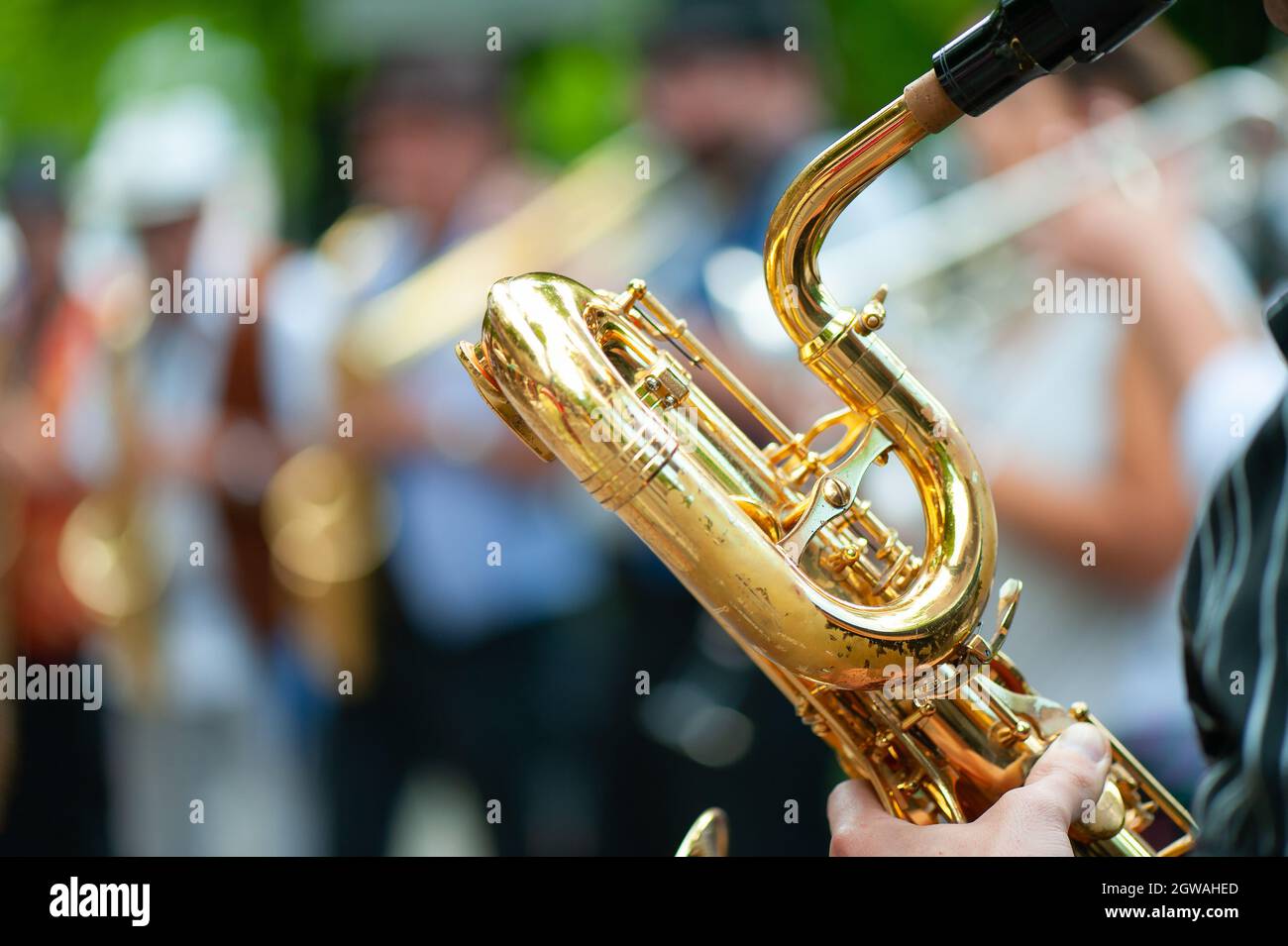 Man Holding Saxophone High Resolution Stock Photography and Images - Alamy