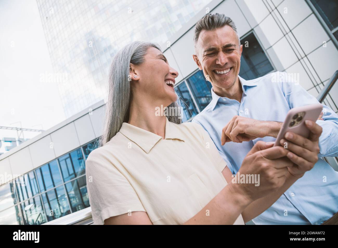 cinematic image of a multiethnic business team. employees speaking ...