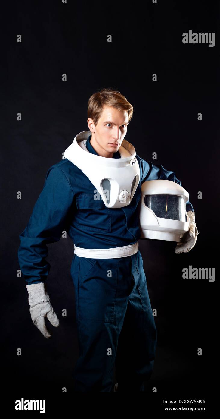 Space suit holding technology space helmet hi-res stock photography and ...