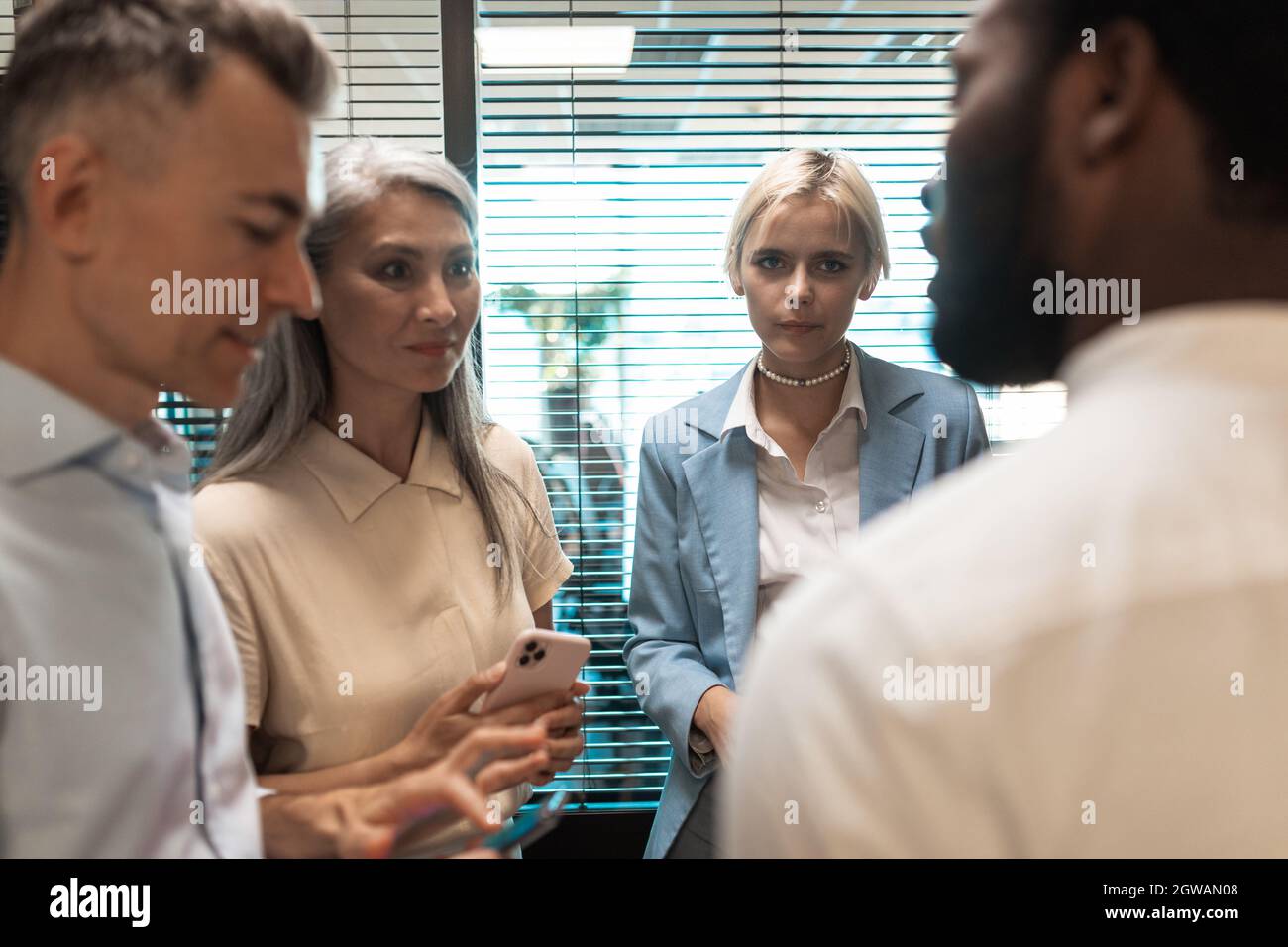 cinematic image of a multiethnic business team. employees working ...