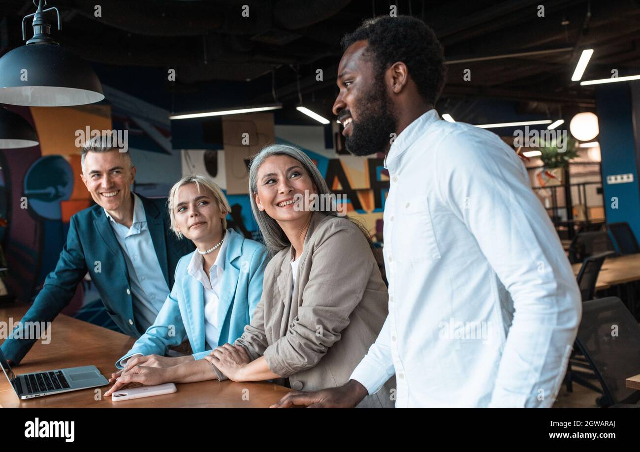 cinematic image of a multiethnic business team. employees working ...