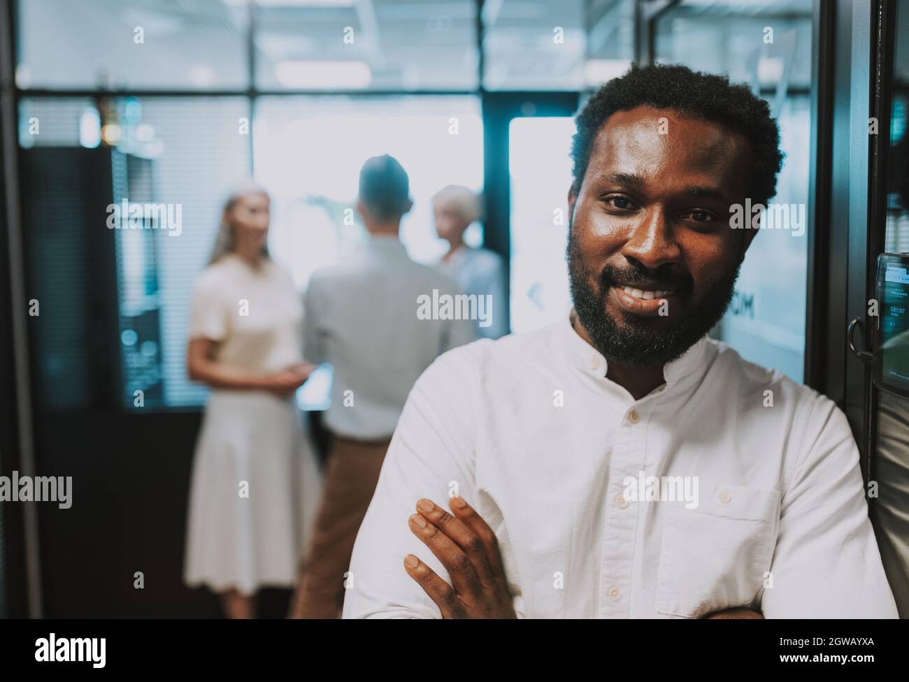 cinematic image of a multiethnic business team. employees speaking ...