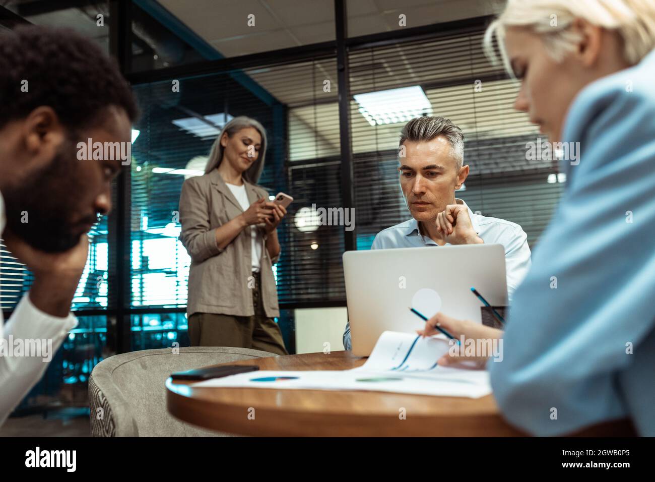 cinematic image of a multiethnic business team. employees working ...
