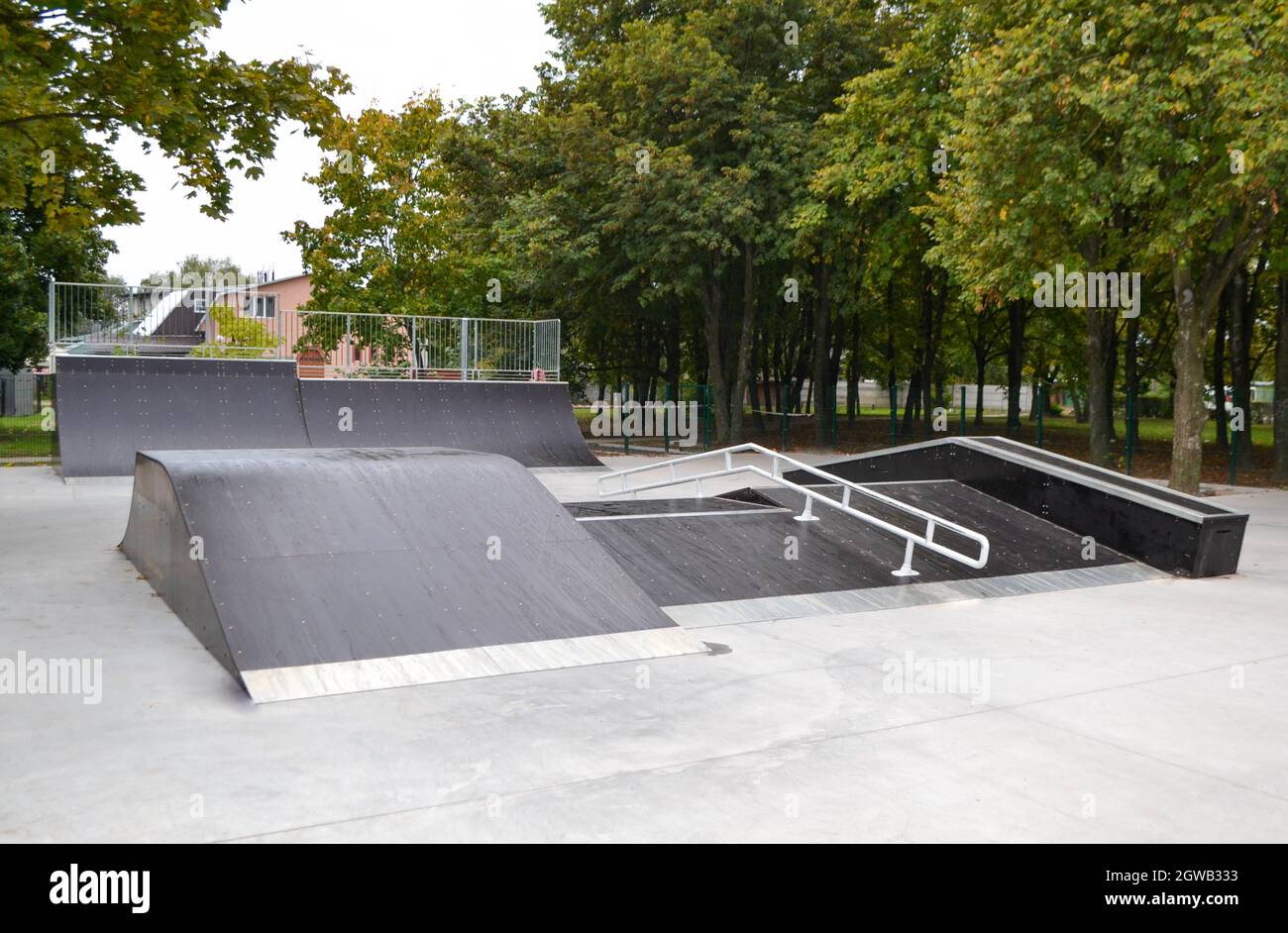 skatepark ramps in the park on autumn Stock Photo - Alamy