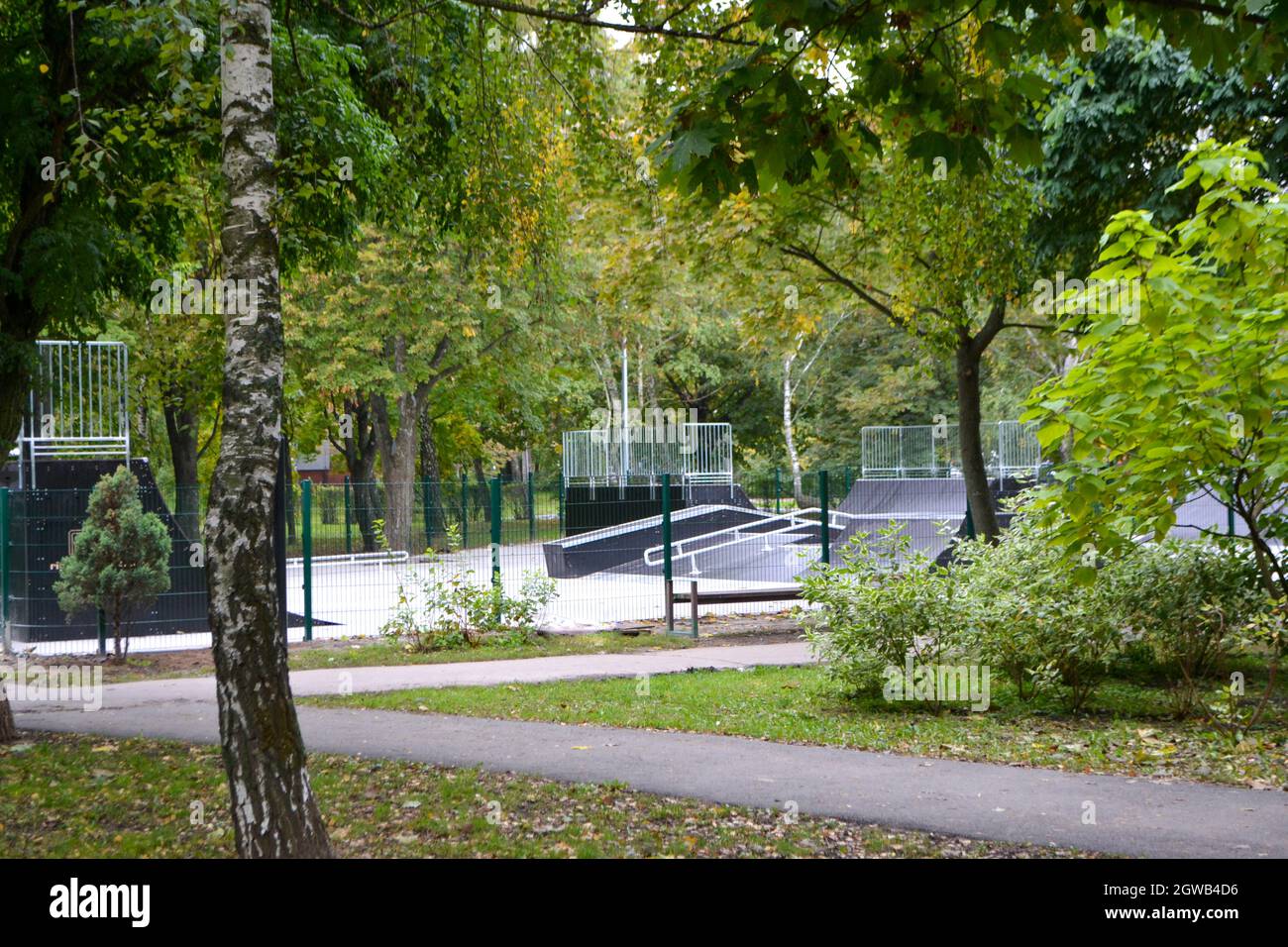 skatepark ramps in the park on autumn Stock Photo - Alamy