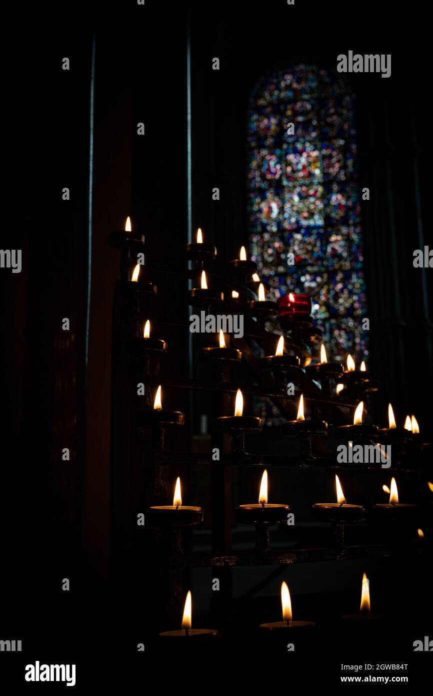 Stained glass window behind hi-res stock photography and images - Alamy