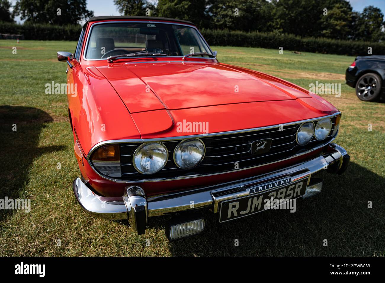 Classic red Triumph Stag sports car at countryside car show Stock Photo ...