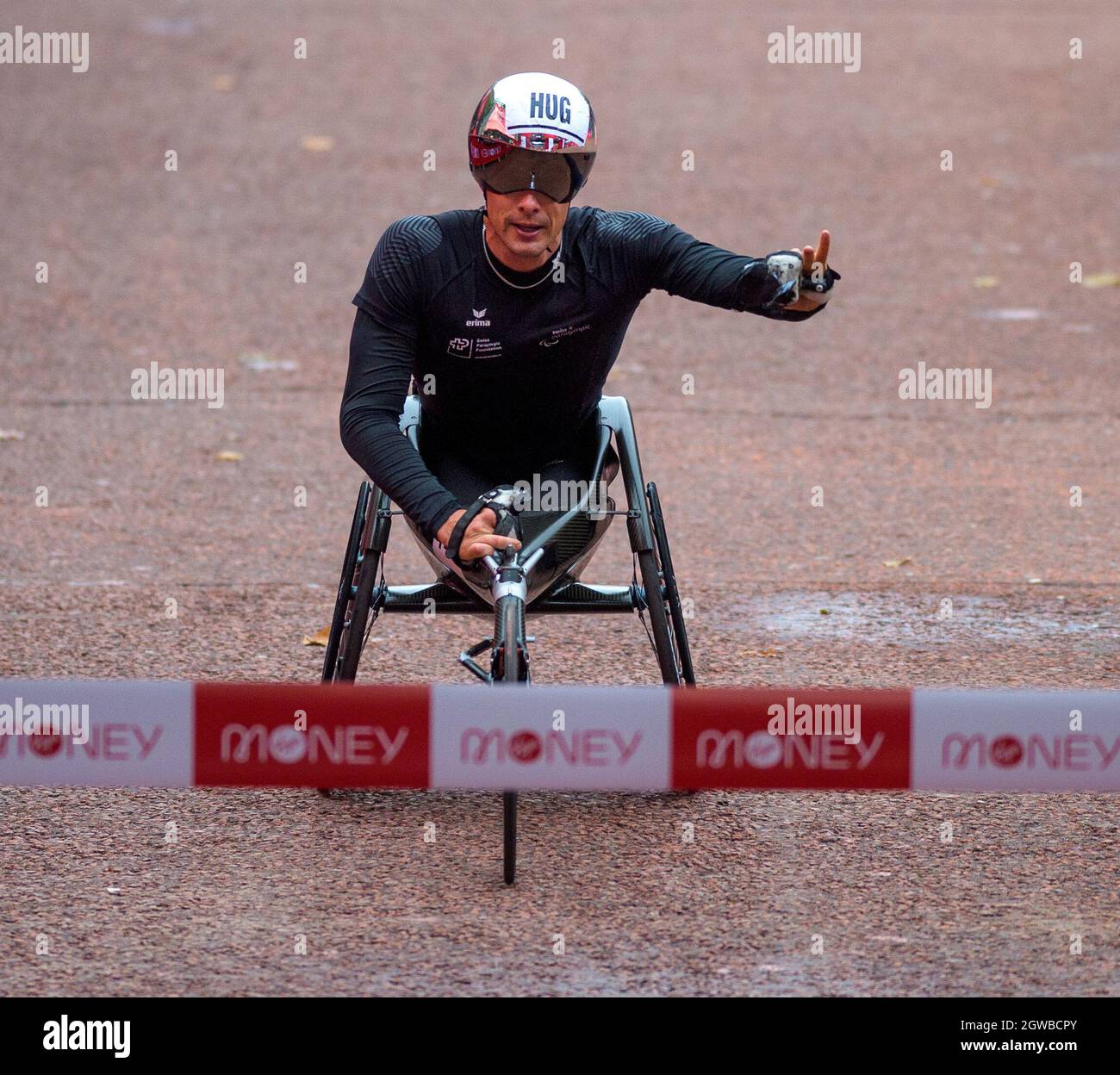London, UK. 3rd Oct, 2021. Marcel Hug wins the men's wheelchair race at ...