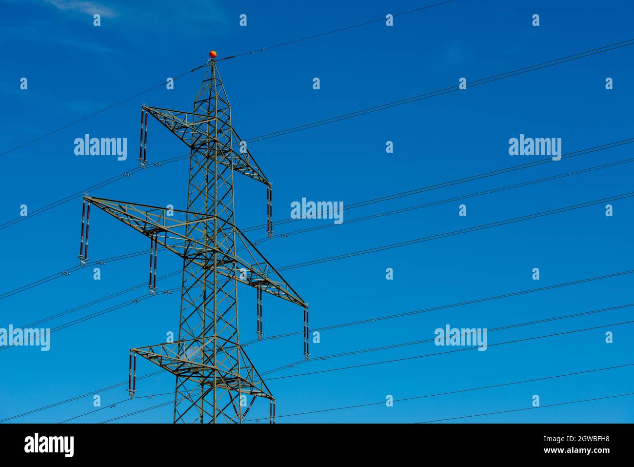pylon for the transport of high voltage electricity Stock Photo - Alamy