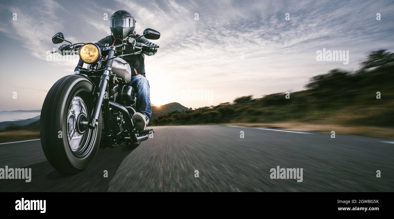 Biker riding motorcycle low angle hi-res stock photography and images ...