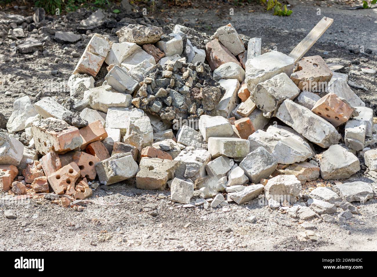 A pile of construction waste. Pieces of concrete and brick Stock Photo ...