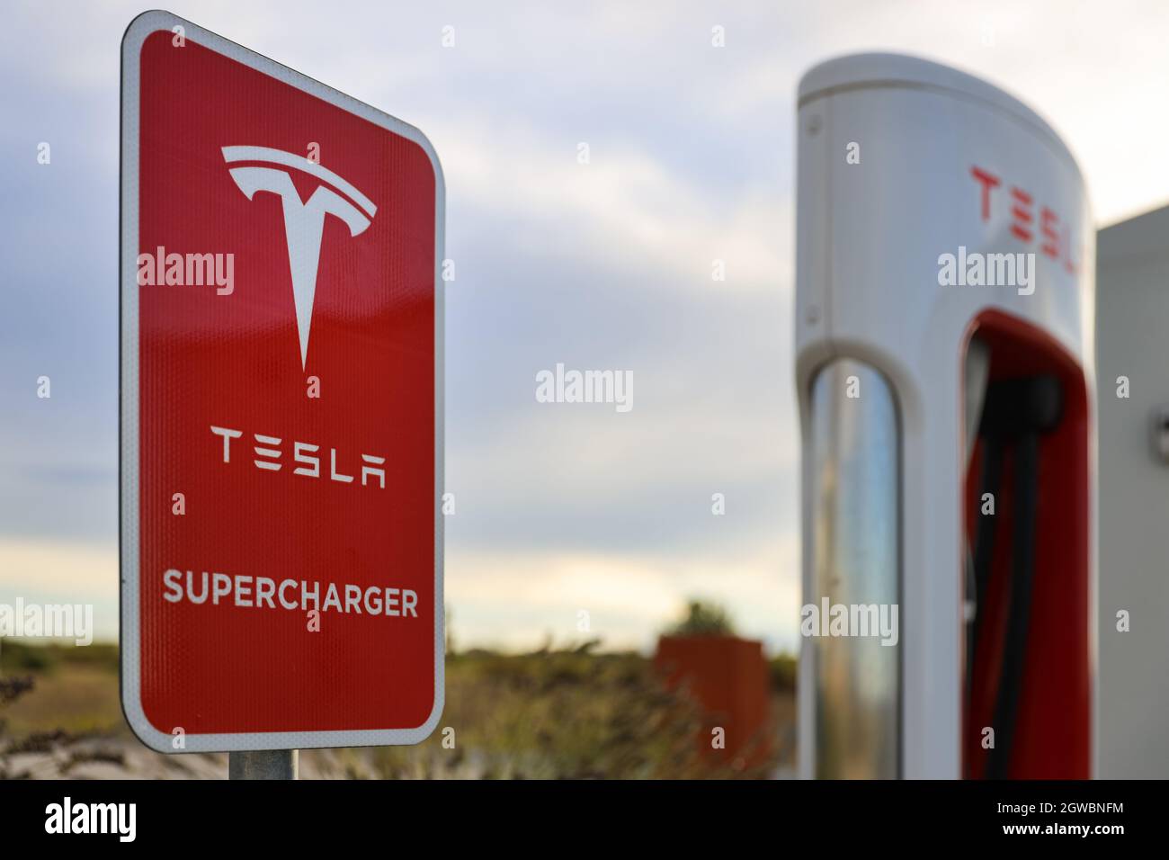 A Tesla Supercharger seen at a Shell petrol station. (Photo by Filip ...