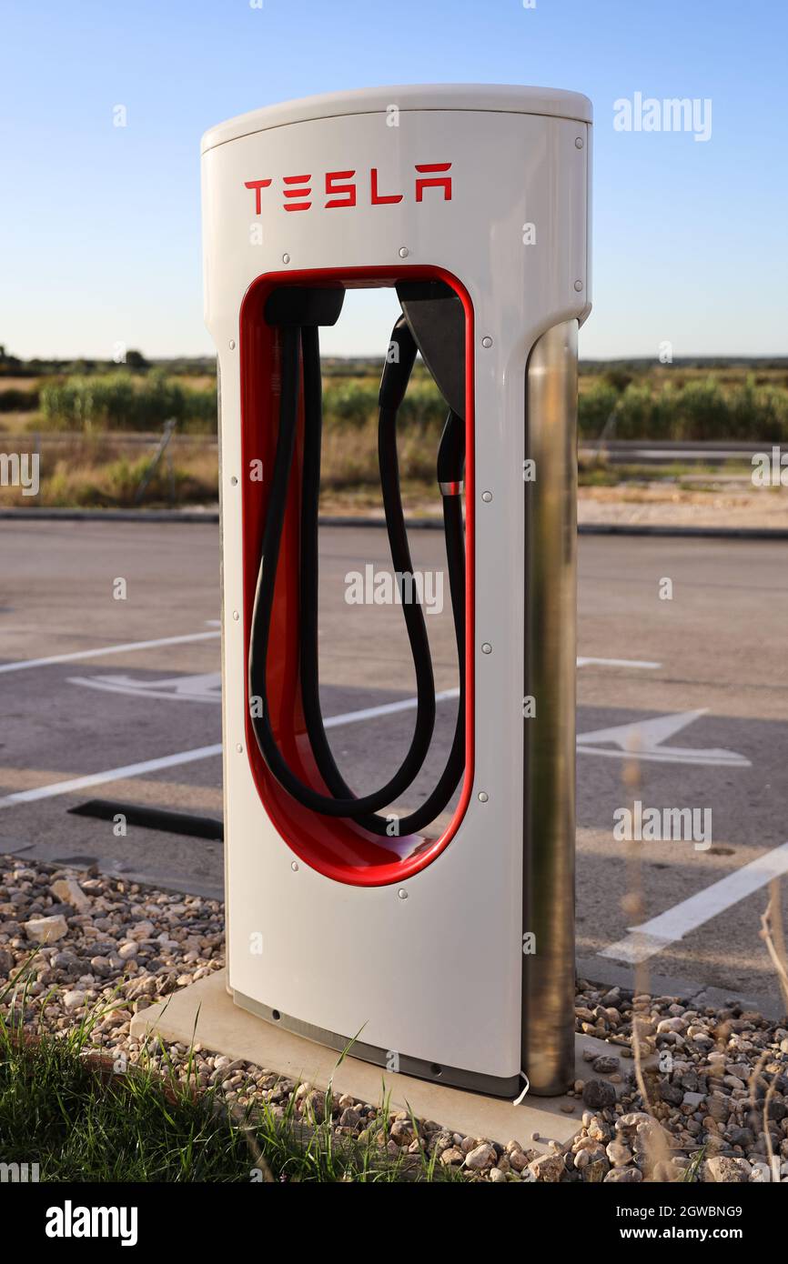 A Tesla Supercharger seen at a Shell petrol station. (Photo by Filip ...