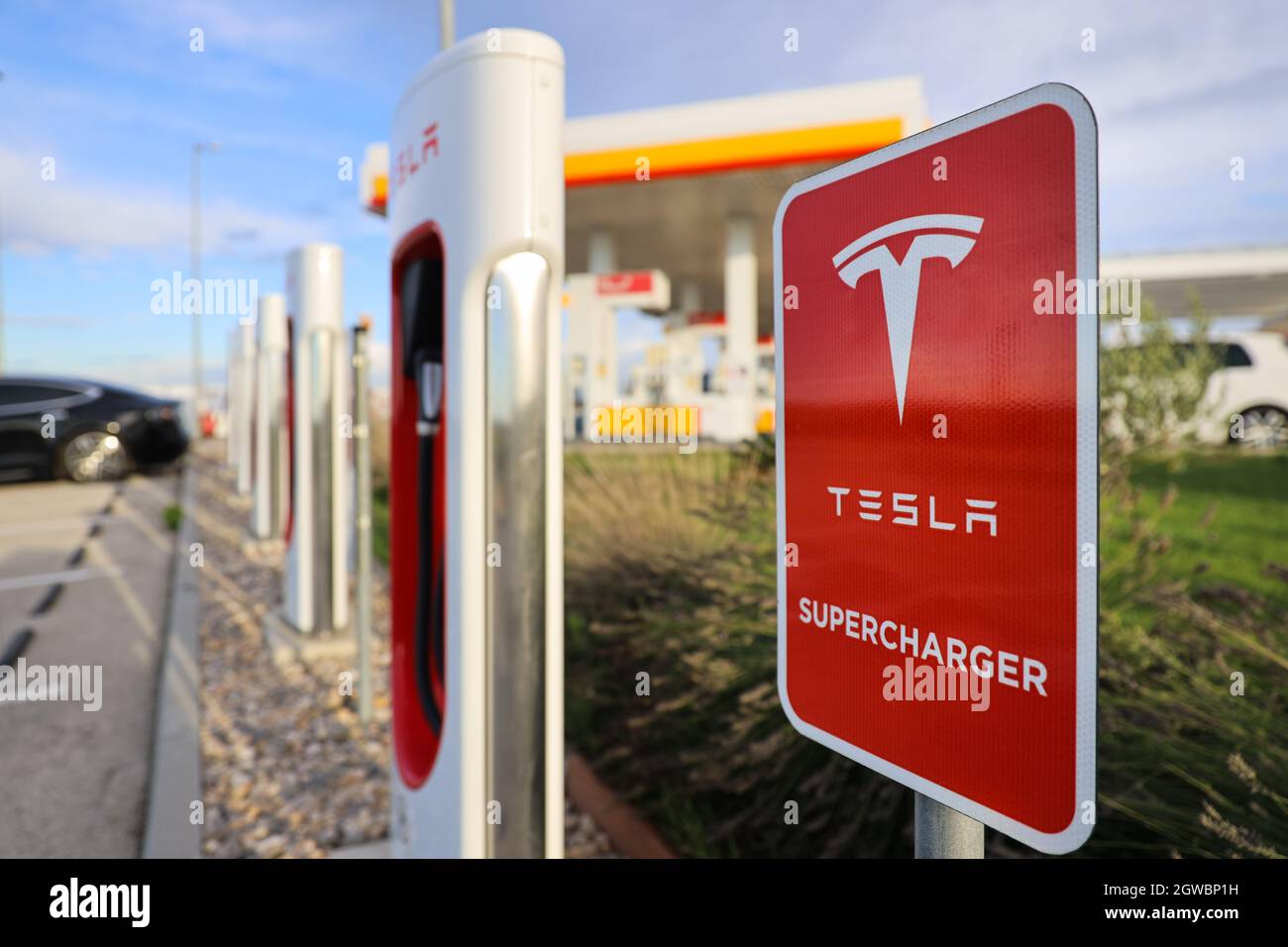 A Tesla Supercharger seen at a Shell petrol station. (Photo by Filip ...