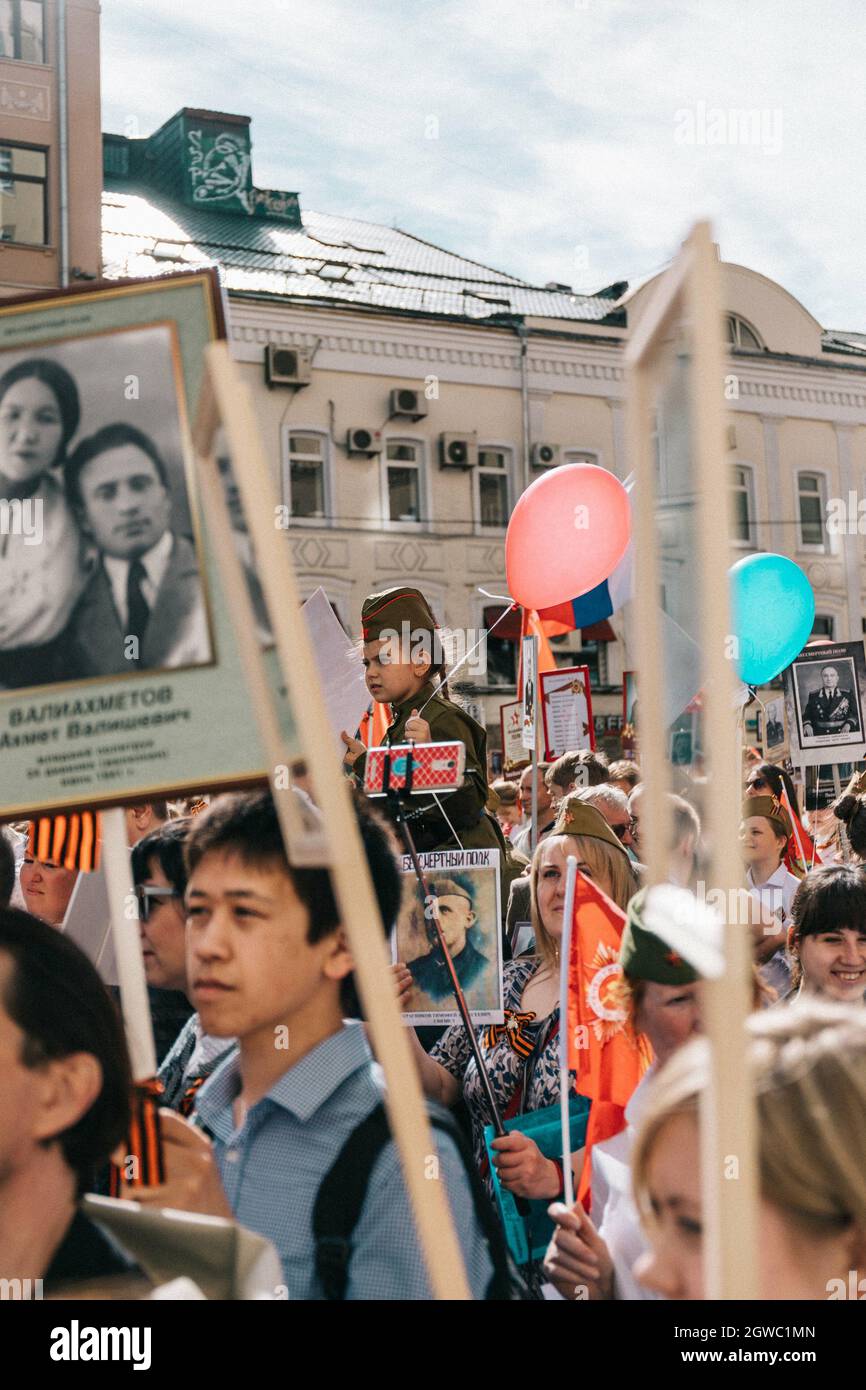 MOSCOW, RUSSIA - May 09, 2018: A vertical, close-up shot of crowd with ...