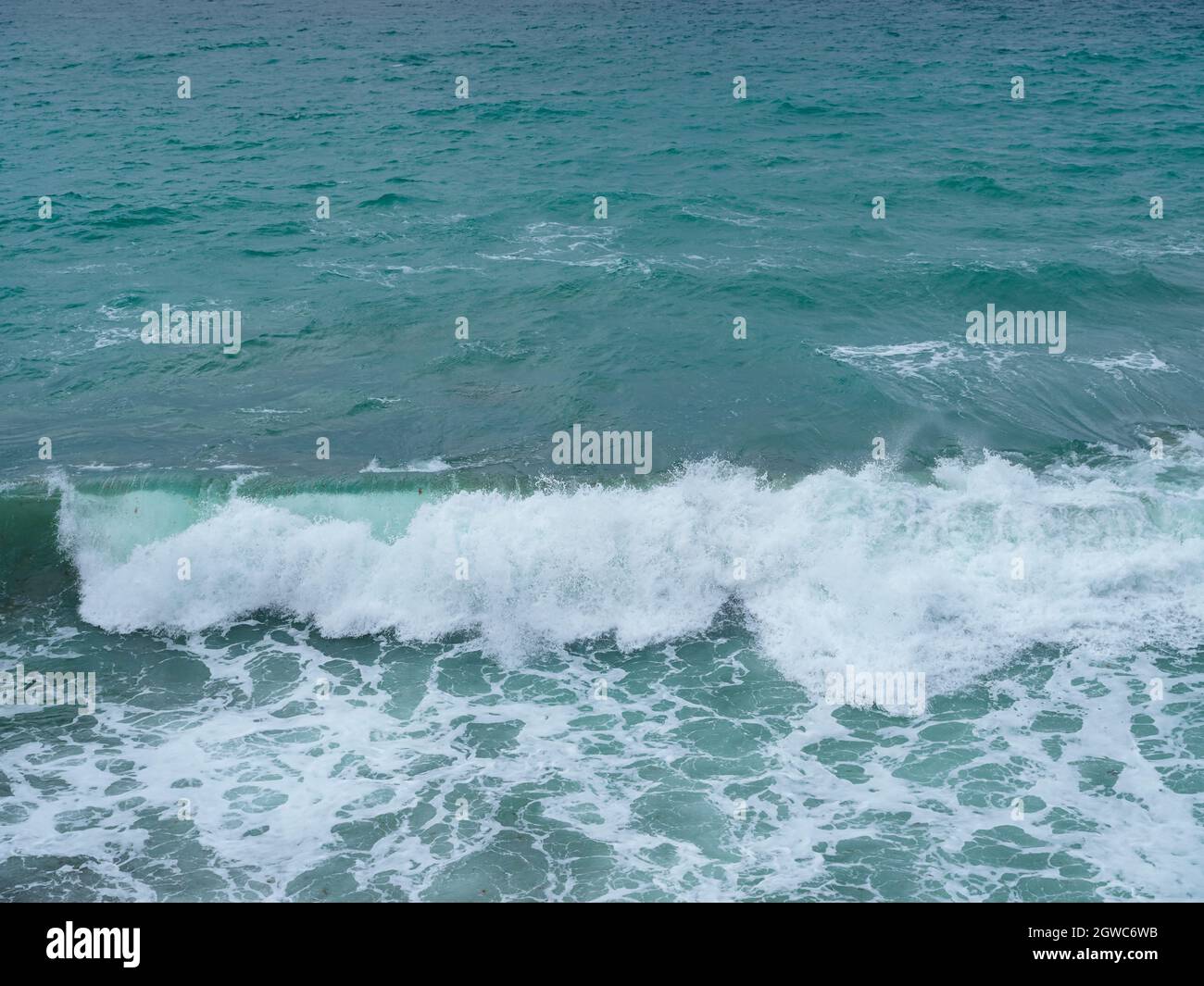 Beautiful view of ocean waves and a fantastic rocky shore, Sea patterns ...