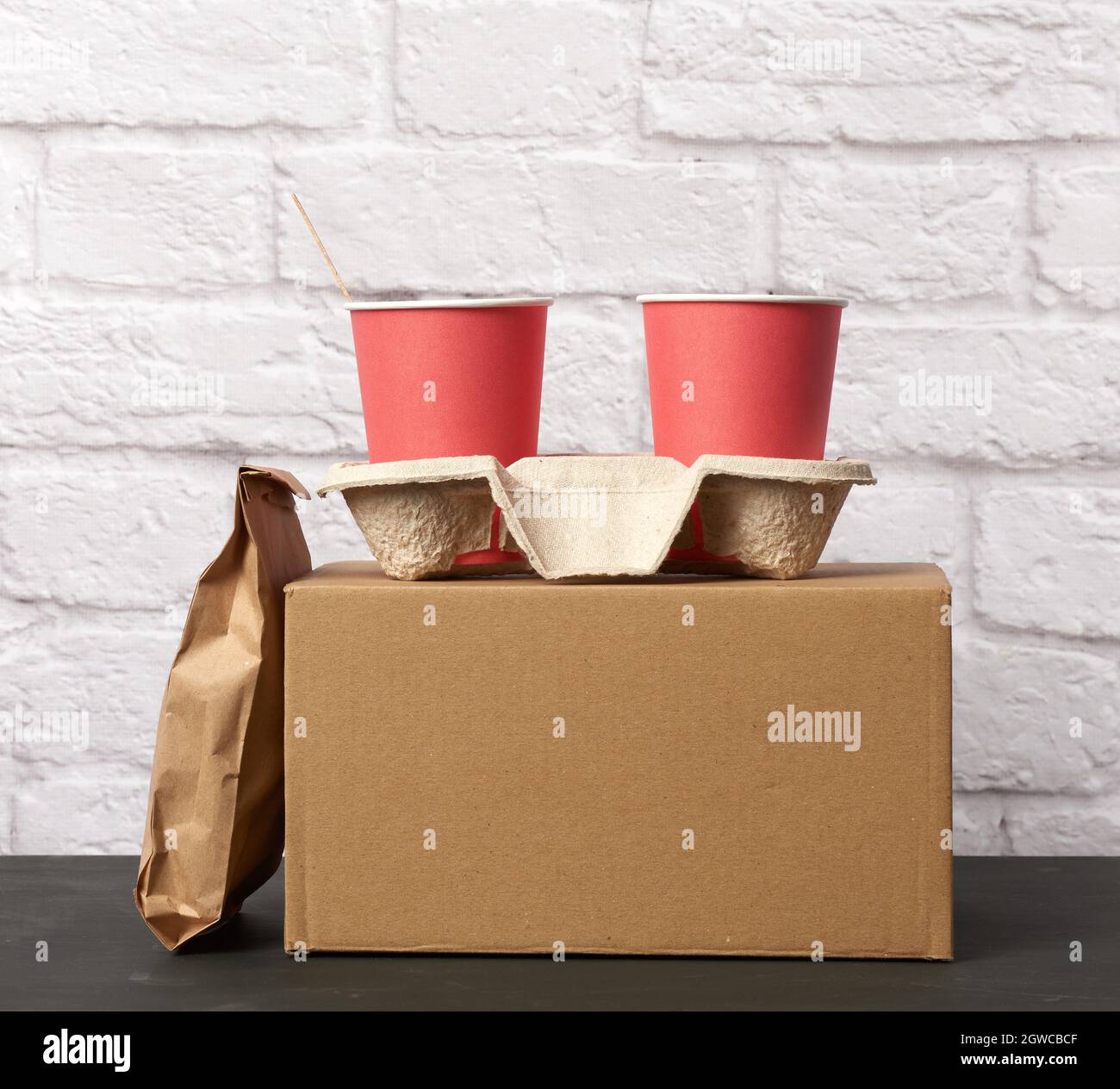 Red Paper Disposable Cups Stand In The Tray, White Background, Takeaway ...