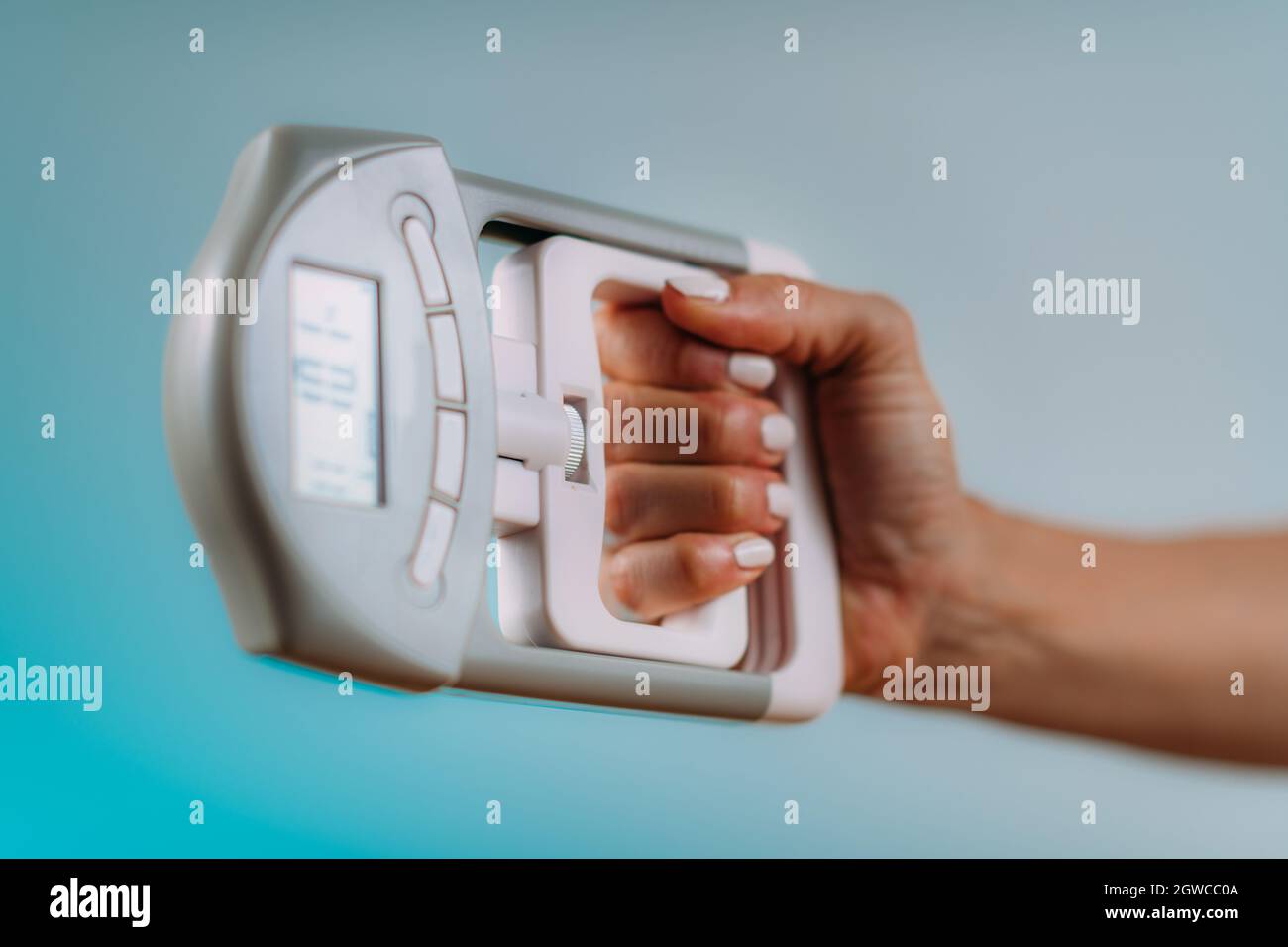 Grip strength dynamometer hi-res stock photography and images - Alamy