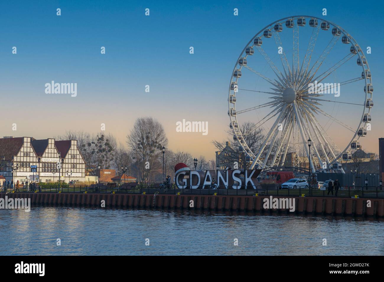 GDANSK, POLAND - 2020 JANUARY 17. Gdansk sign and ferris wheel on ...