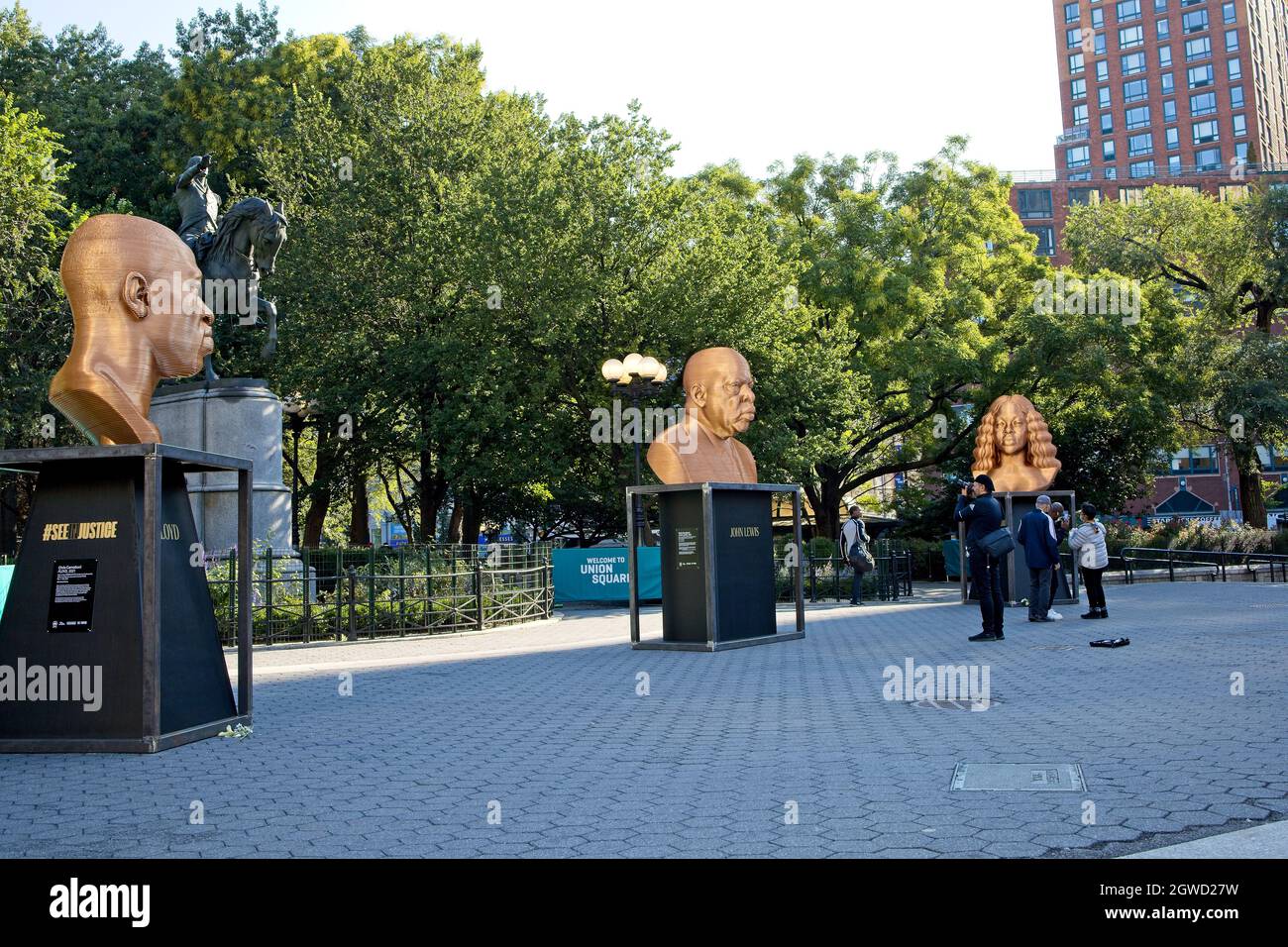 New York, NY, USA - Oct 2, 2021: Busts of George Floyd, John Lewis, and ...