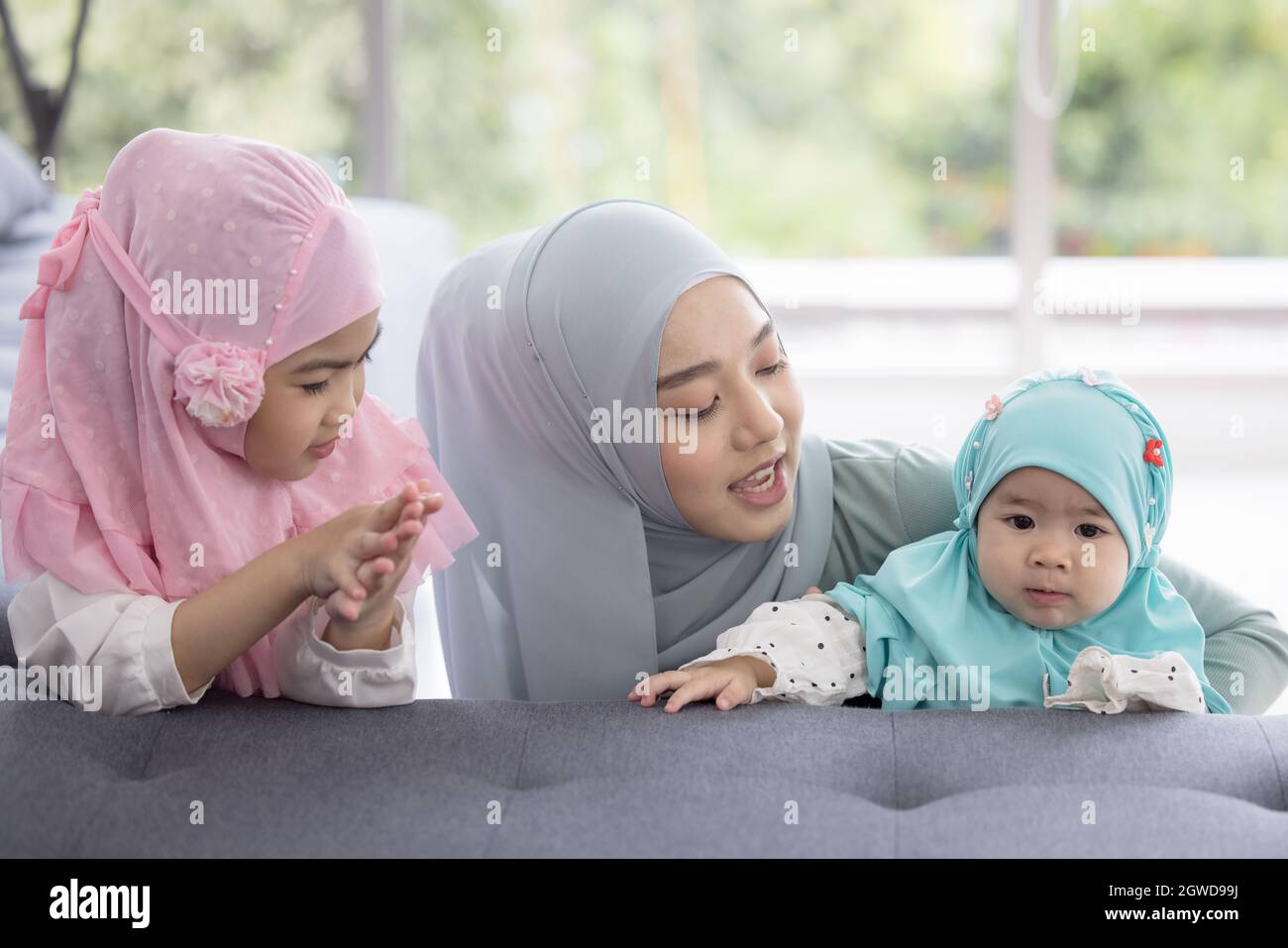 Muslim family portrait sofa hi-res stock photography and images - Alamy