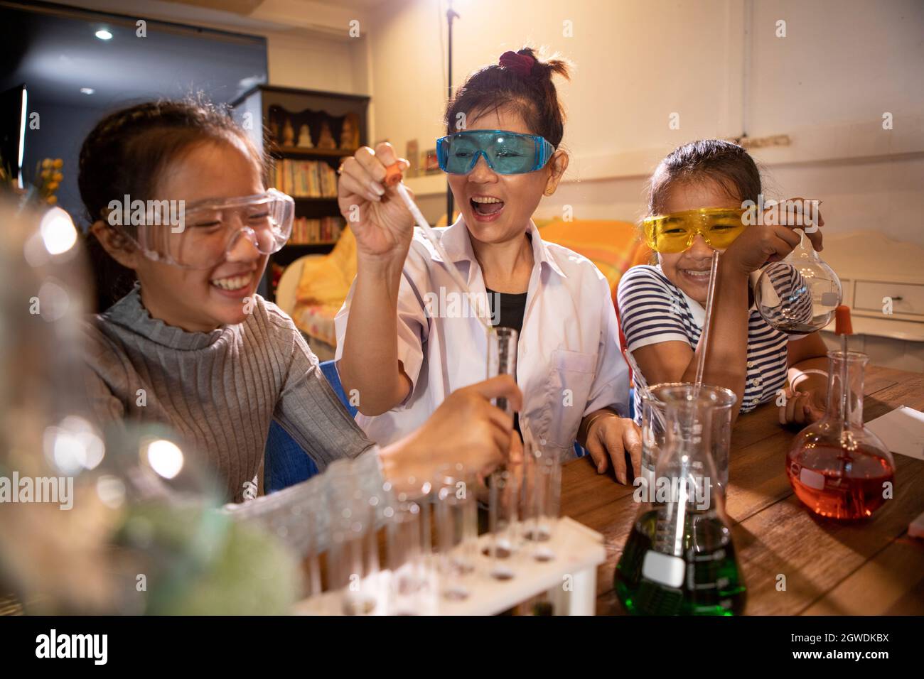 Teacher chemistry lab laughing hi-res stock photography and images - Alamy