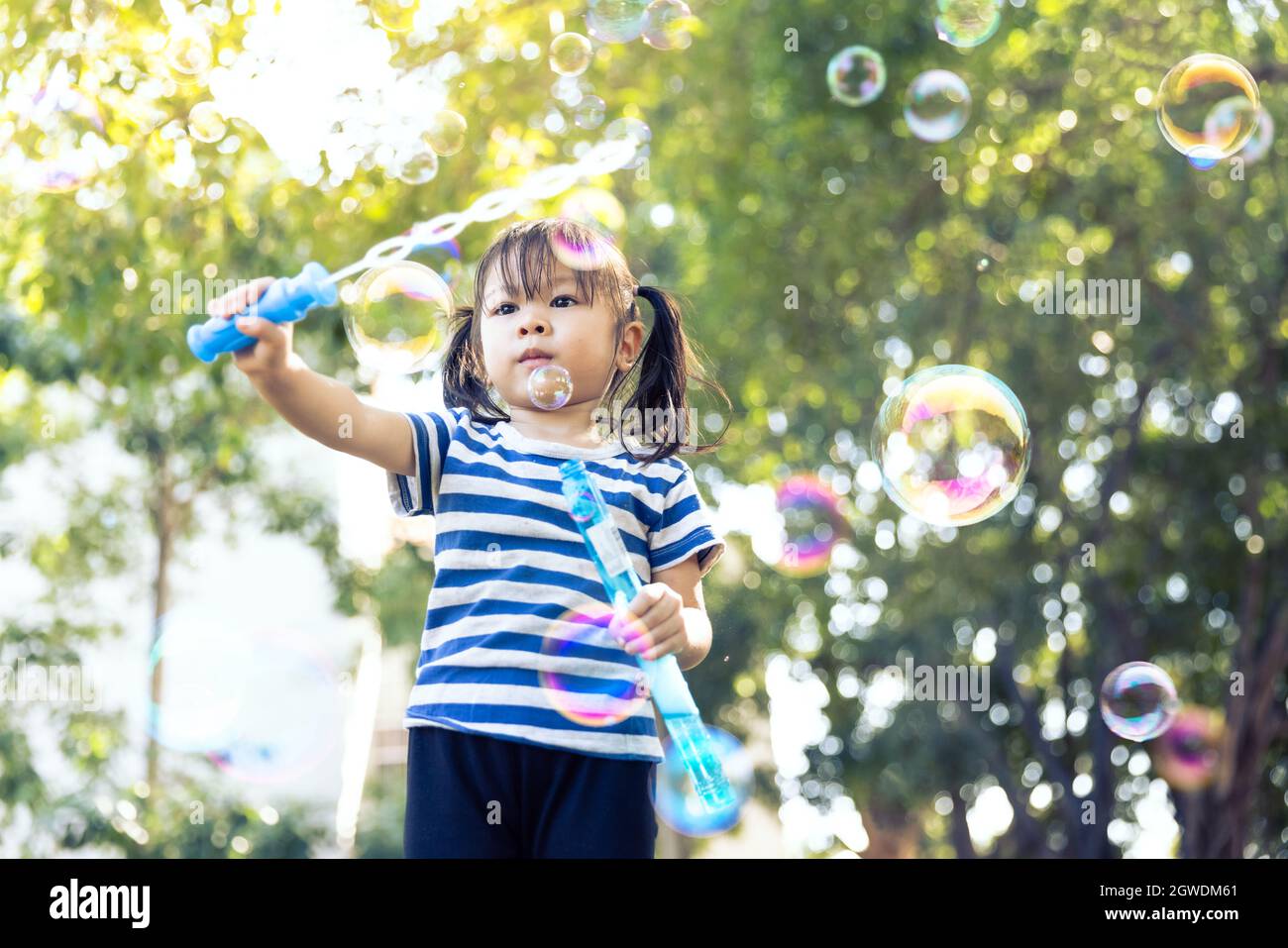 Indian man blowing bubbles hi-res stock photography and images - Alamy