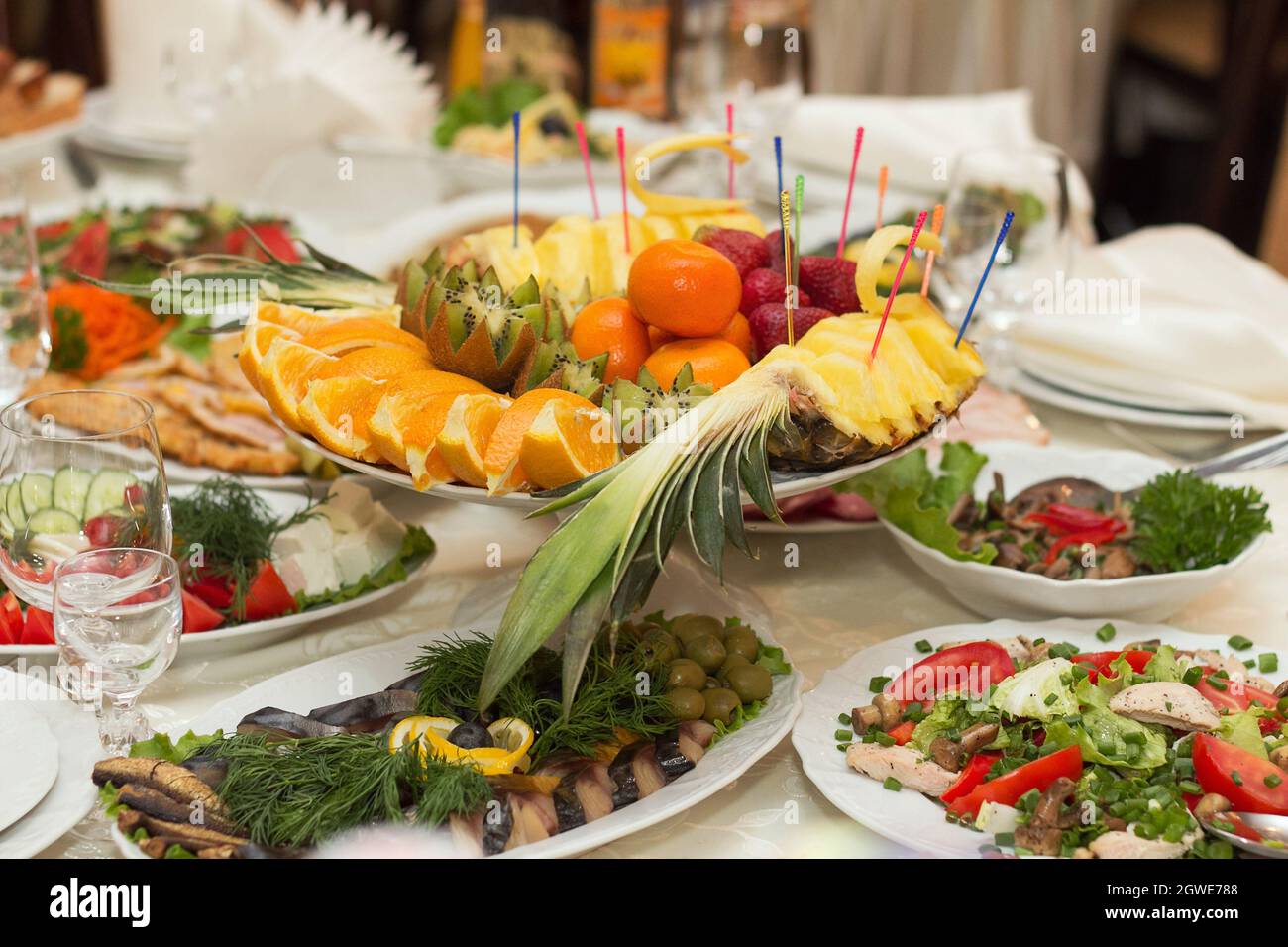 Festive banquet table with food in restaurant Stock Photo - Alamy