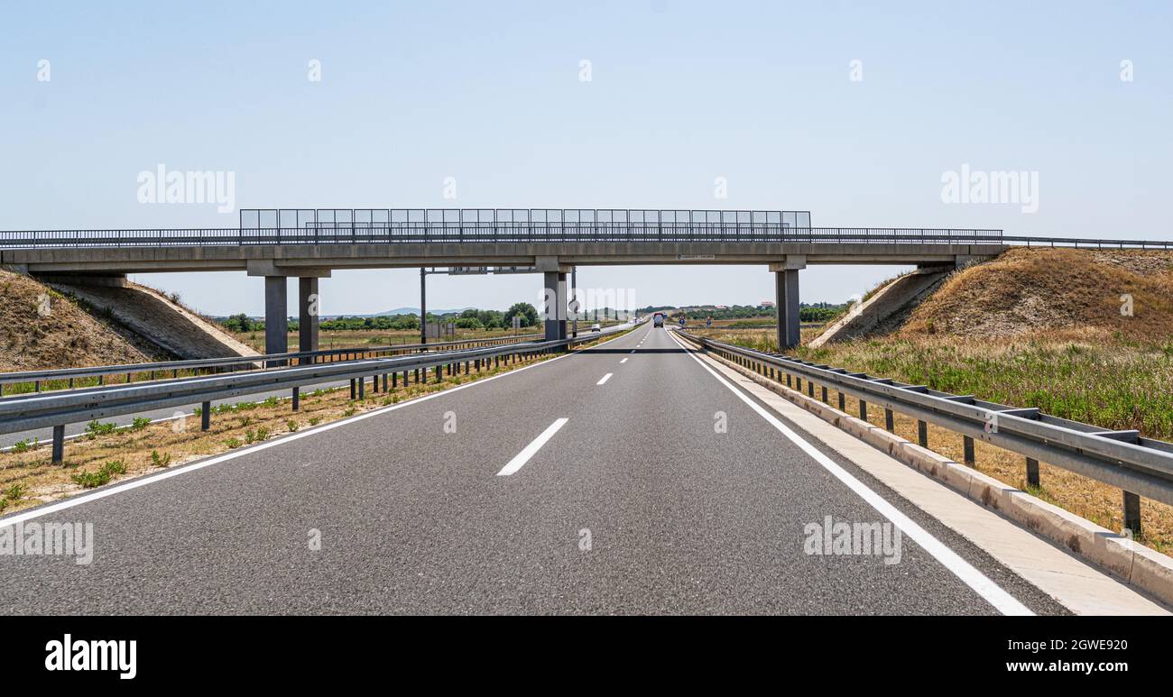 Highway bridge and cars on the road Stock Photo - Alamy