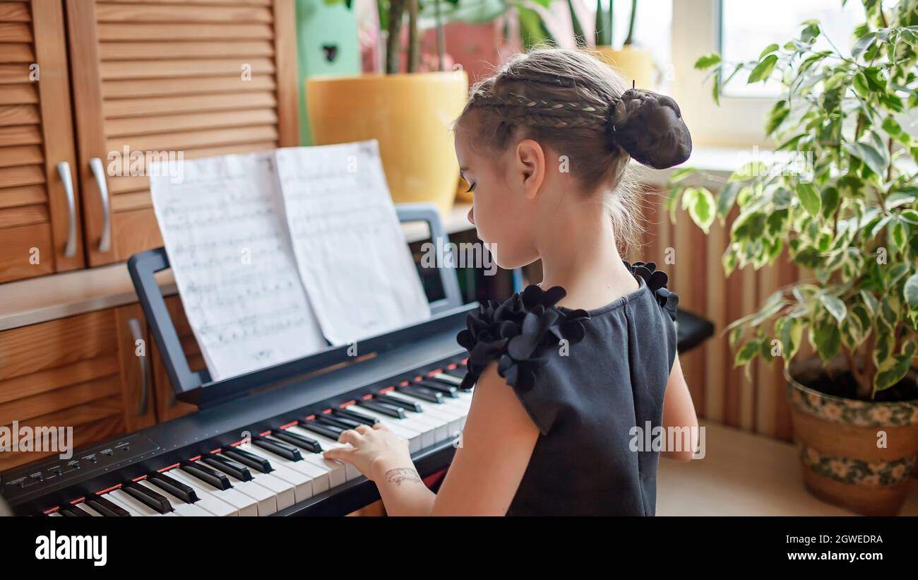 Girl Playing Piano Back View High Resolution Stock Photography and ...